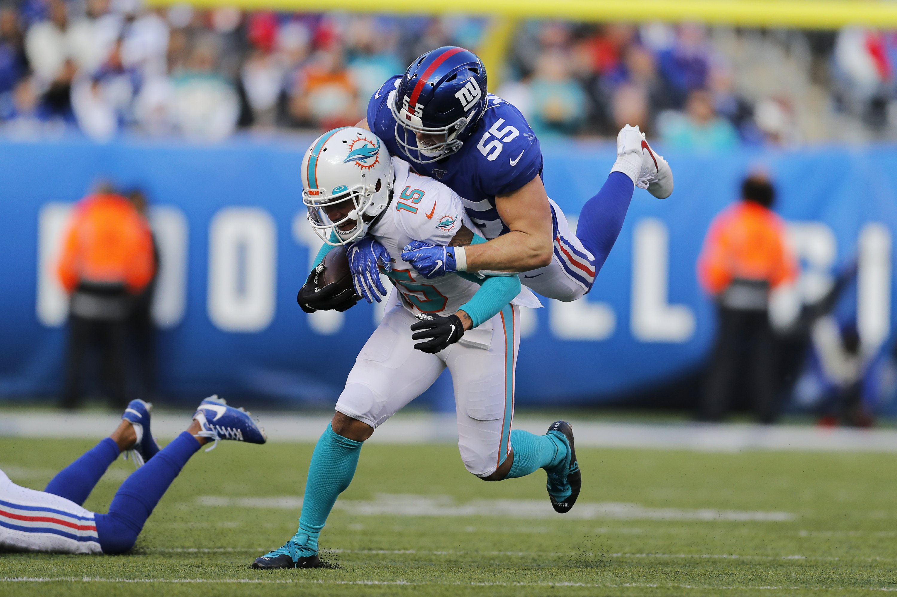 Manning throws 2 TDs, Barkley scores 2, Giants end long skid | AP News