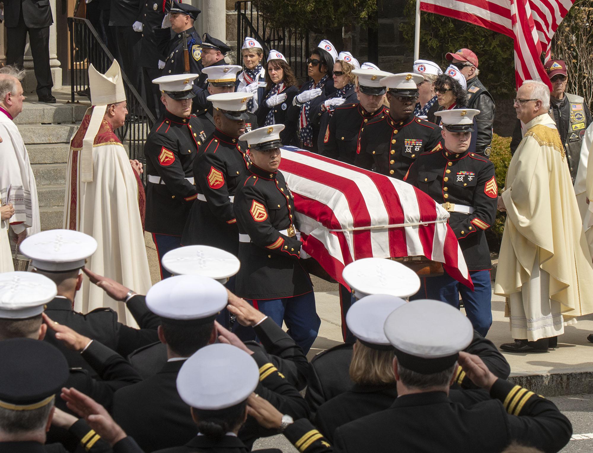 Hundreds line streets at funeral of fallen Marine | AP News