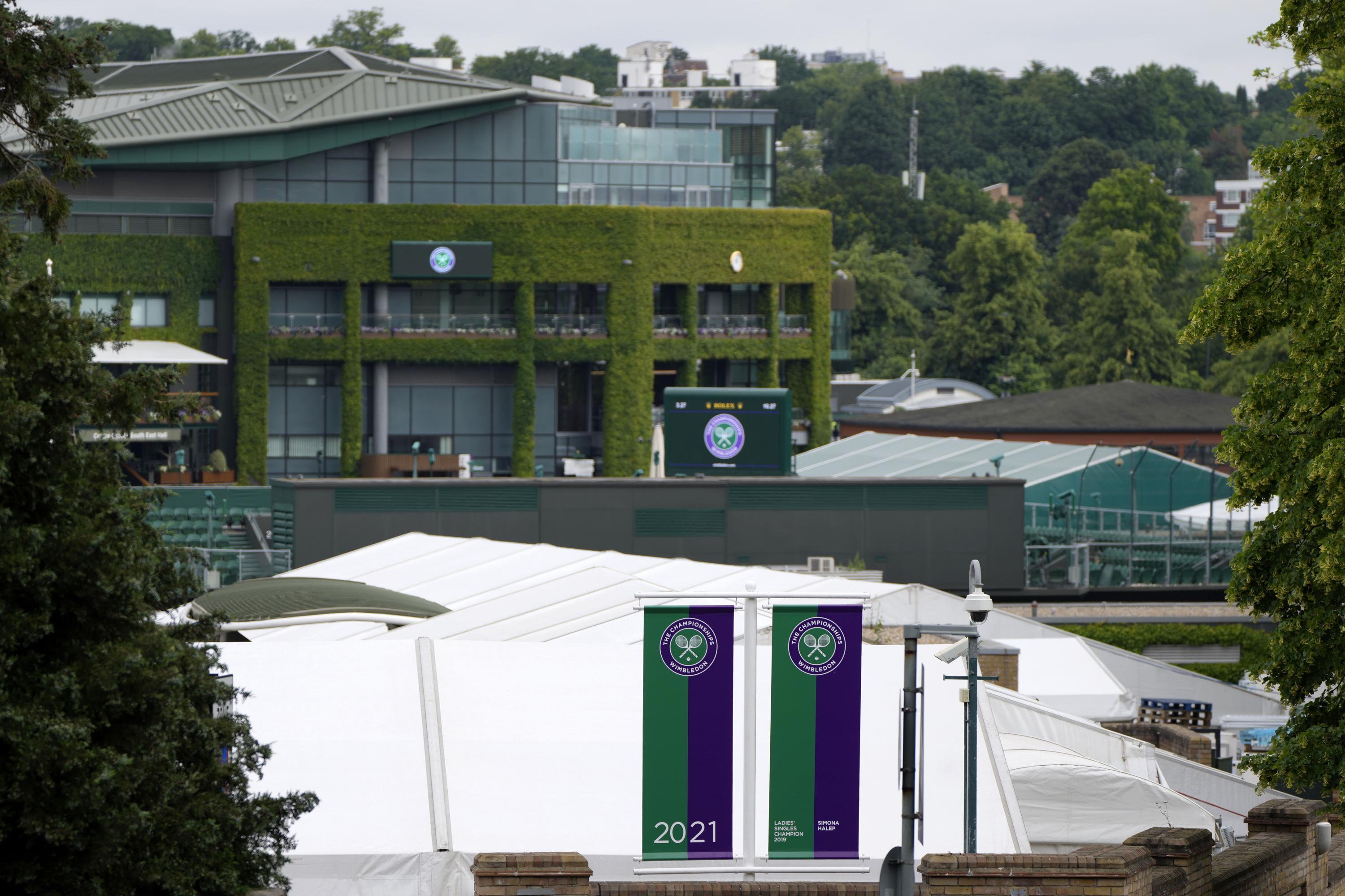 Wimbledon record prize money at full-capacity tournament | AP News