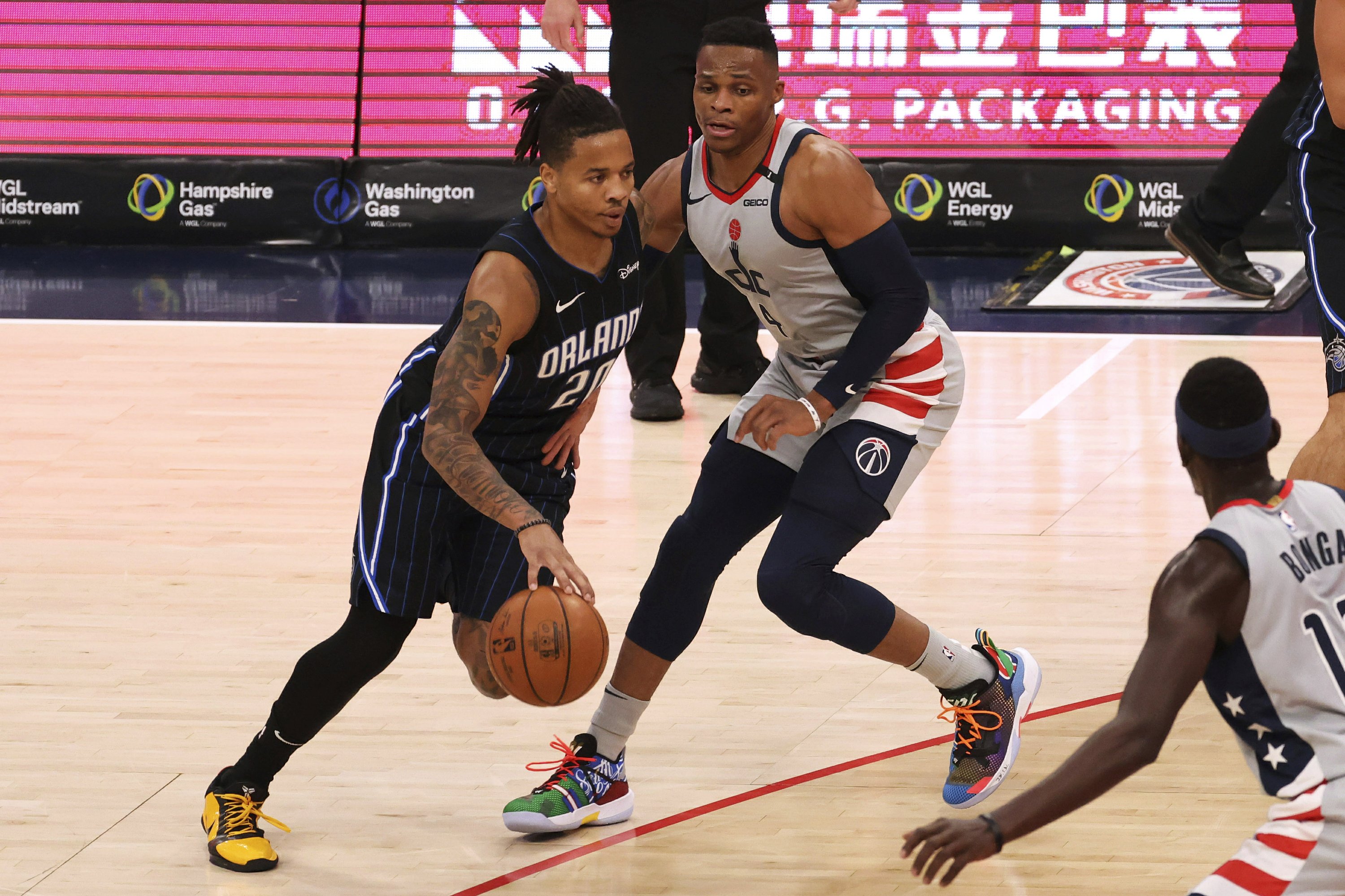 Magic beat Wizards130-120 despite Westbrook's historic night | AP News