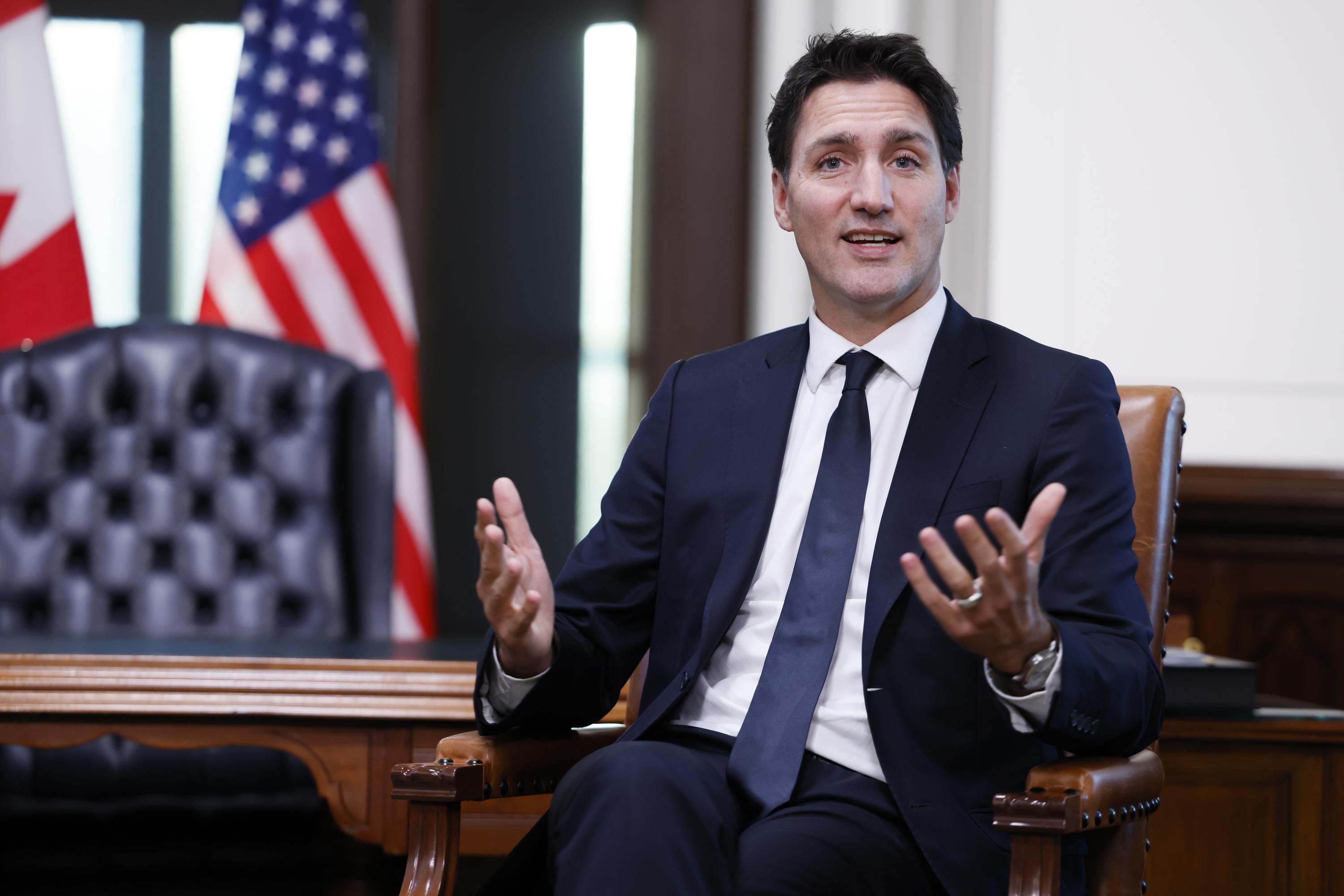 Canada sanctions more Russians, offers bonds for Ukraine | AP News