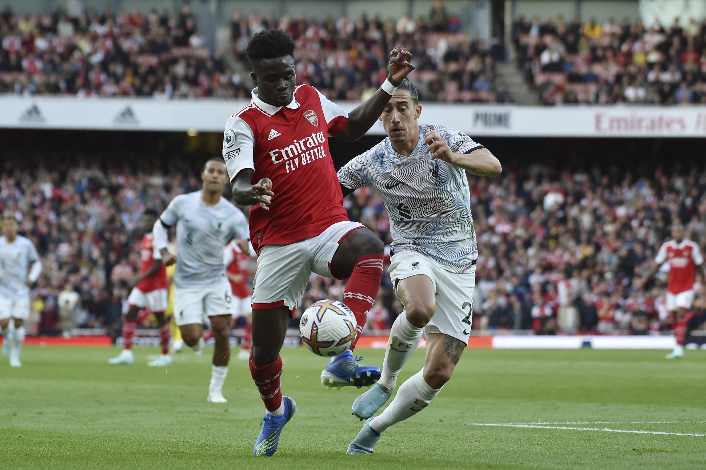 Saka's penalty keeps Arsenal top in 3-2 win over Liverpool | AP News
