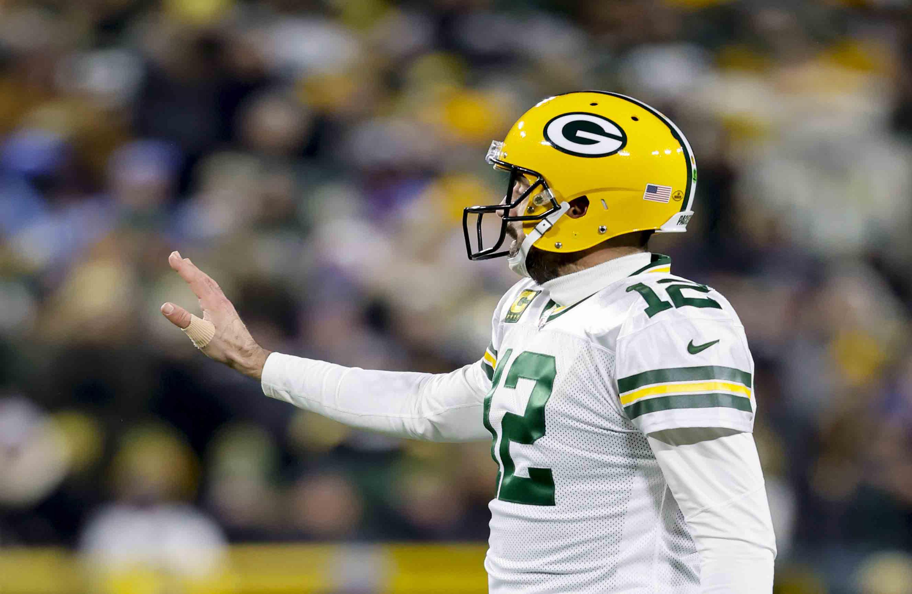 Aaron Rodgers says he's been playing with broken thumb | AP News