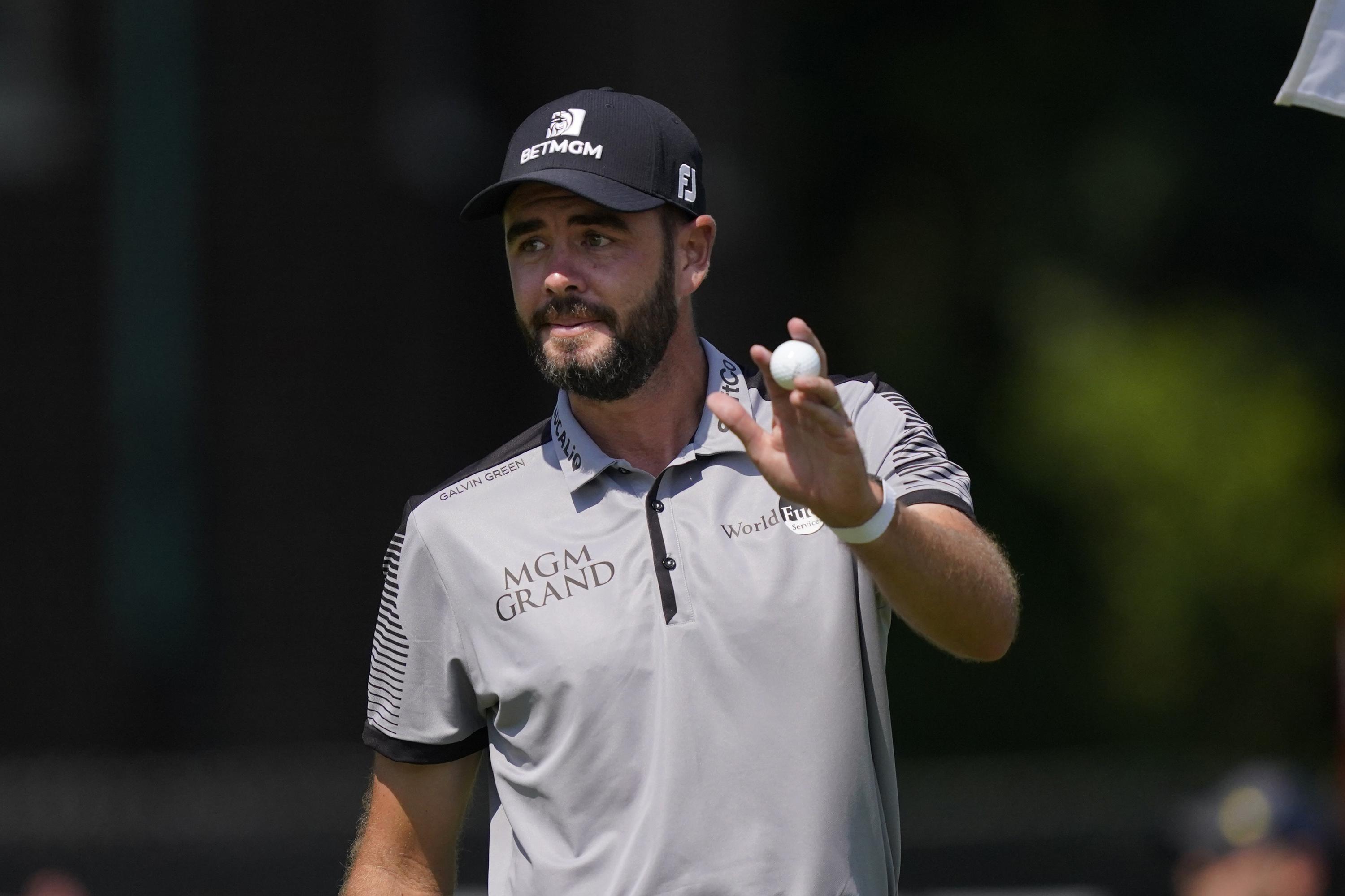 Merrit logra hoyo en uno; comparte liderato con Nieman | AP News