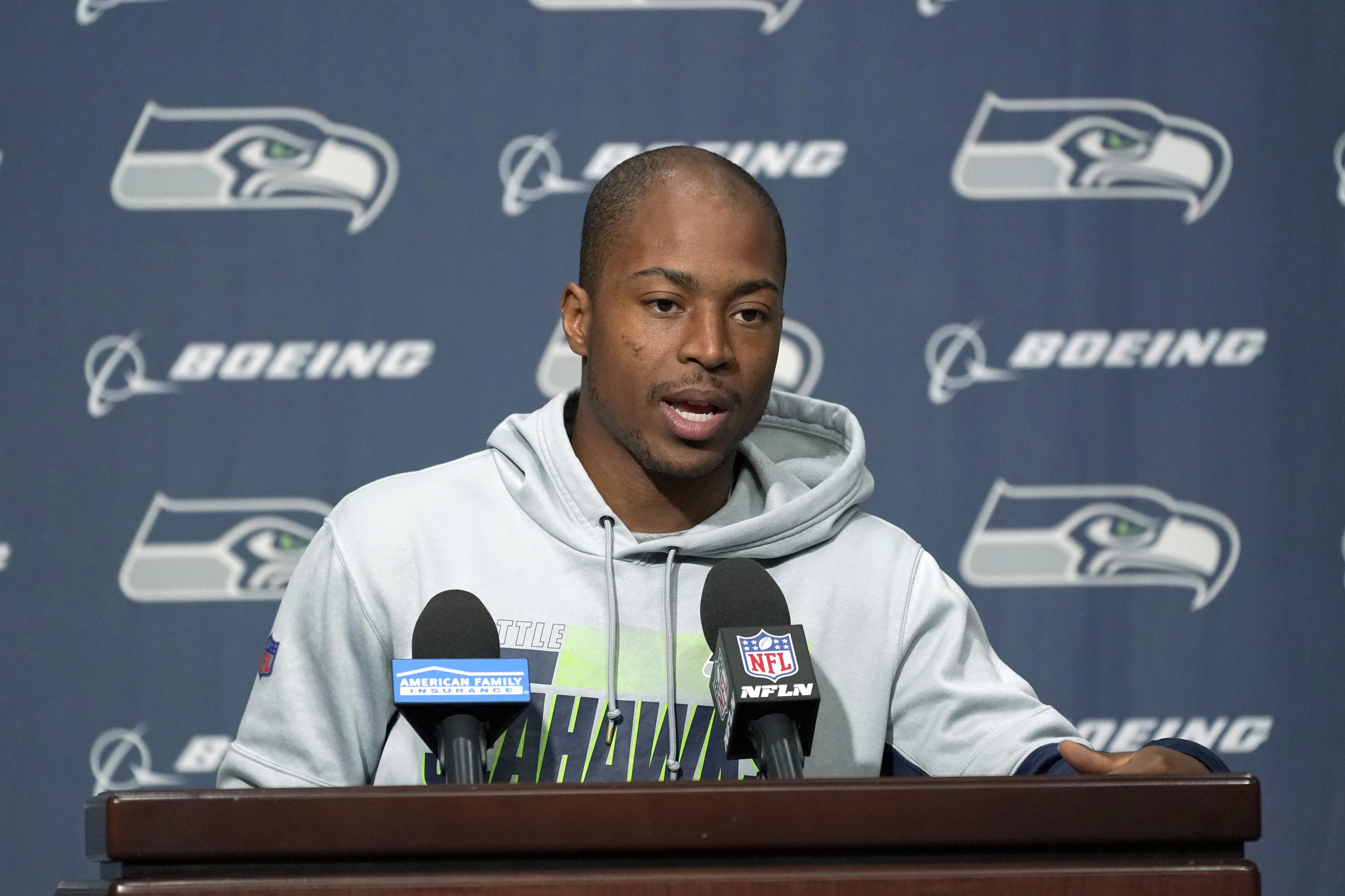 Seahawks' Lockett shies away from attention after hot start | AP News