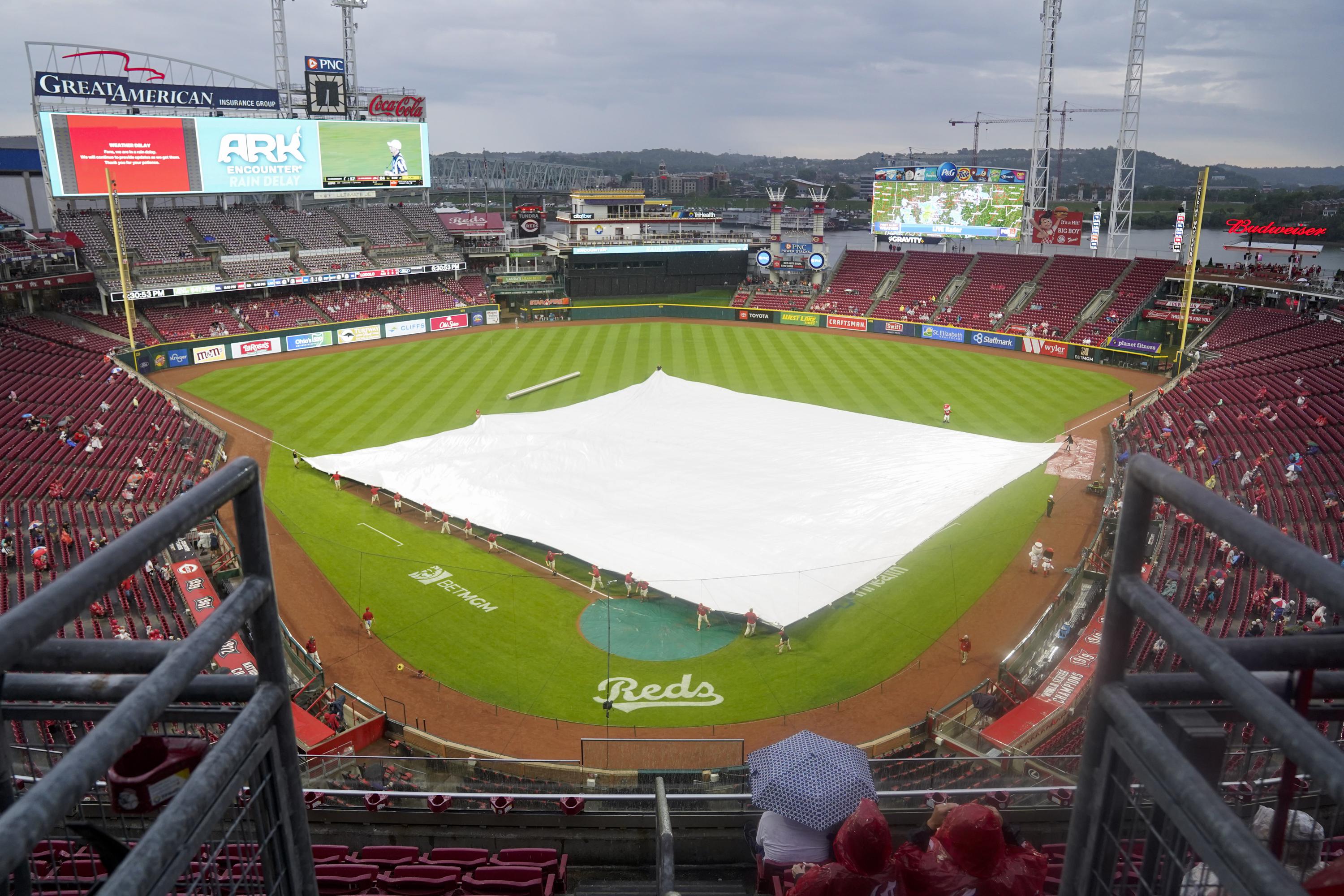 Rockies-Reds game rained out, doubleheader Sunday | AP News
