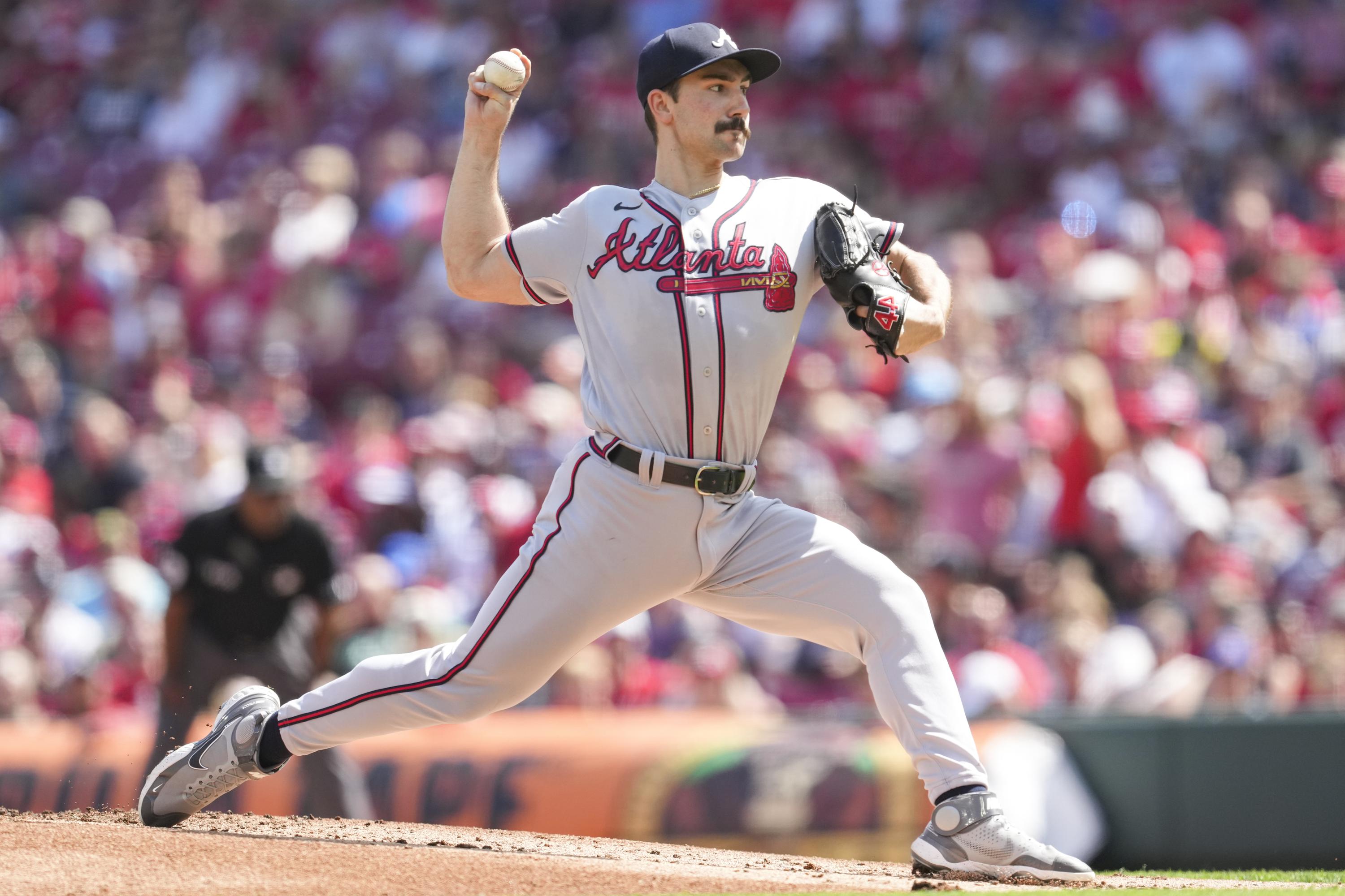 Strider strikes out 11, Riley homers as Braves beat Reds 4-1 | AP News
