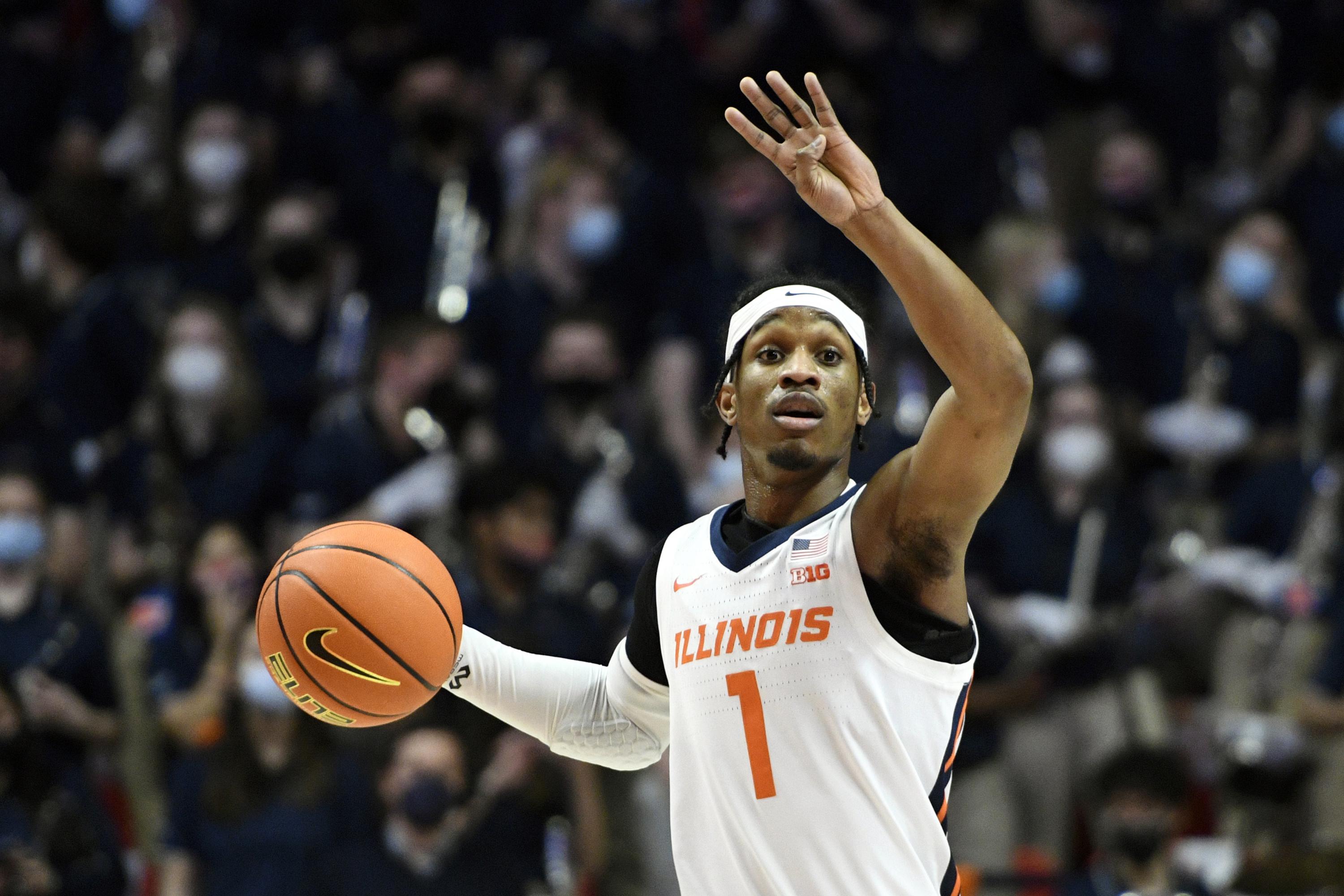 No. 24 Illinois holds off No. 10 Michigan State, 56-55 | AP News