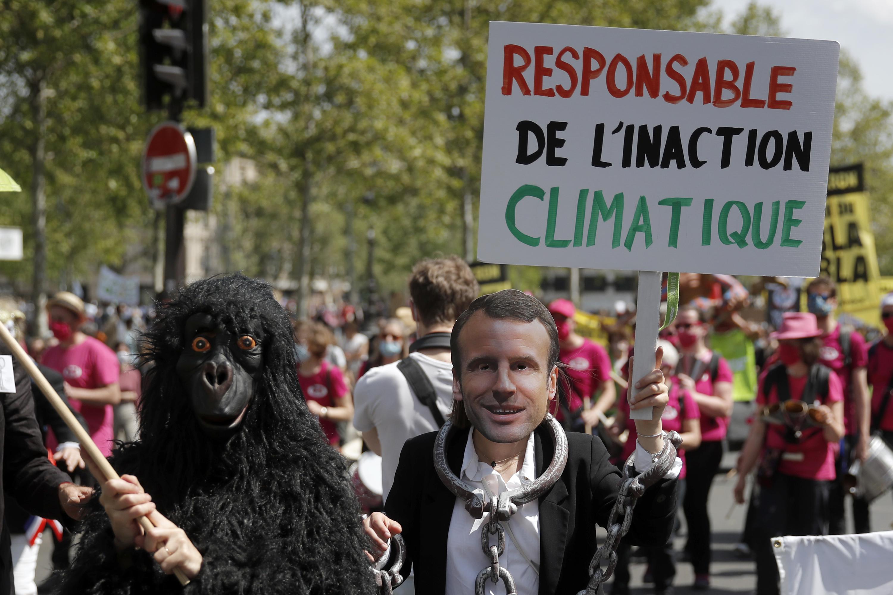 French demonstrators demand more action on climate change | AP News