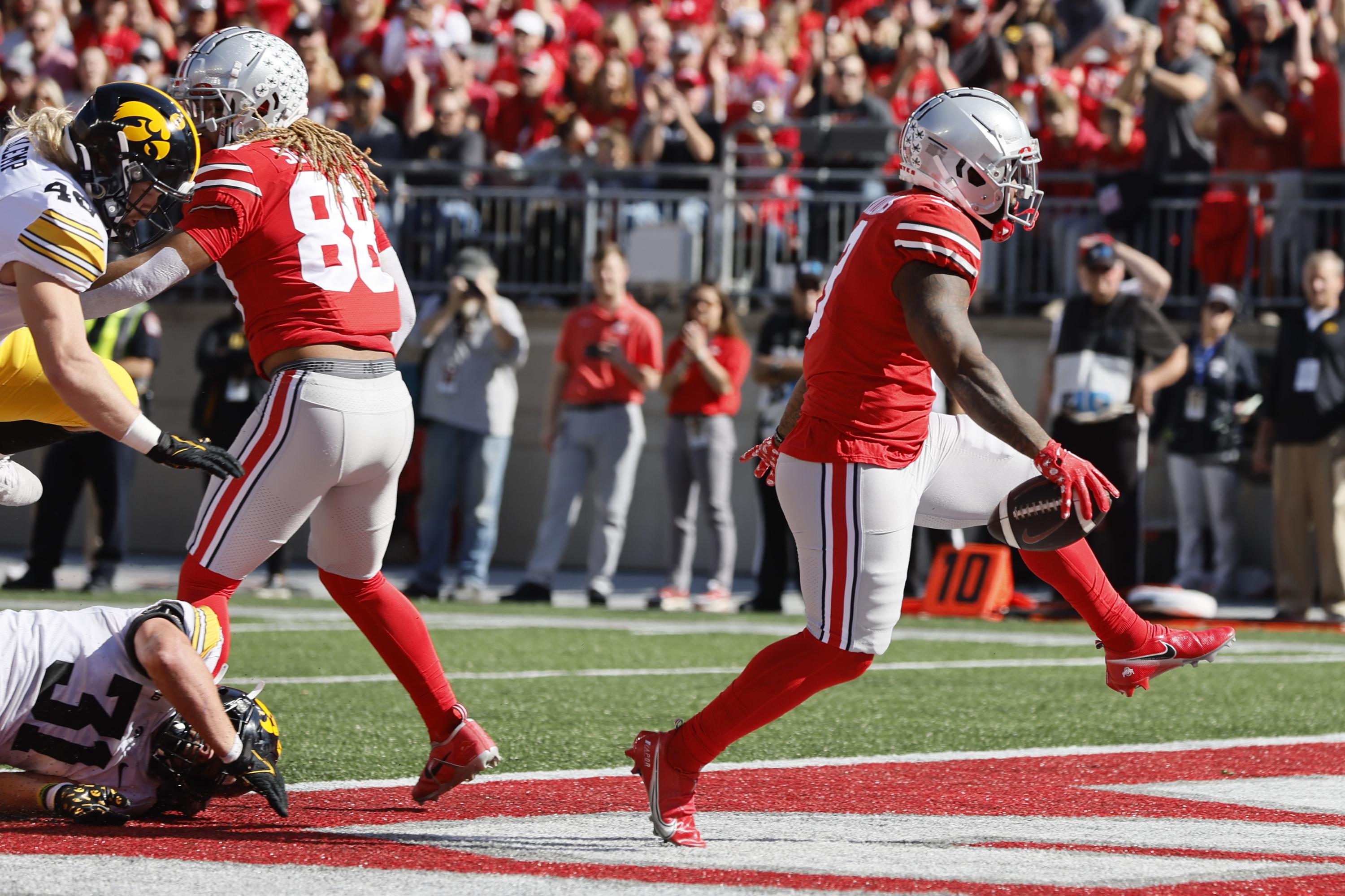 No. 2 Buckeyes catch fire late, pound bumbling Iowa 54-10 | AP News
