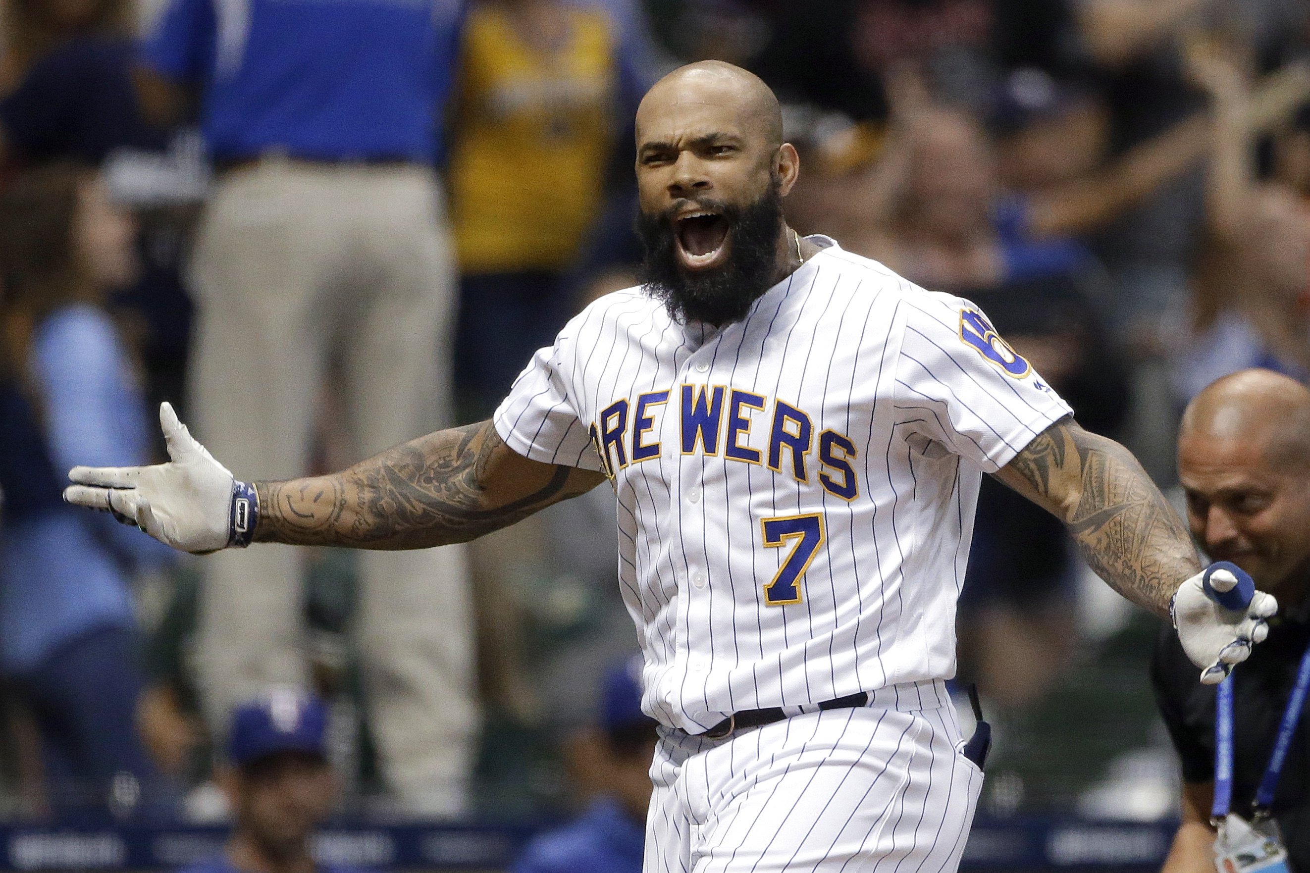 Thames hits game-ending homer as Brewers beat Rangers 6-5 | AP News