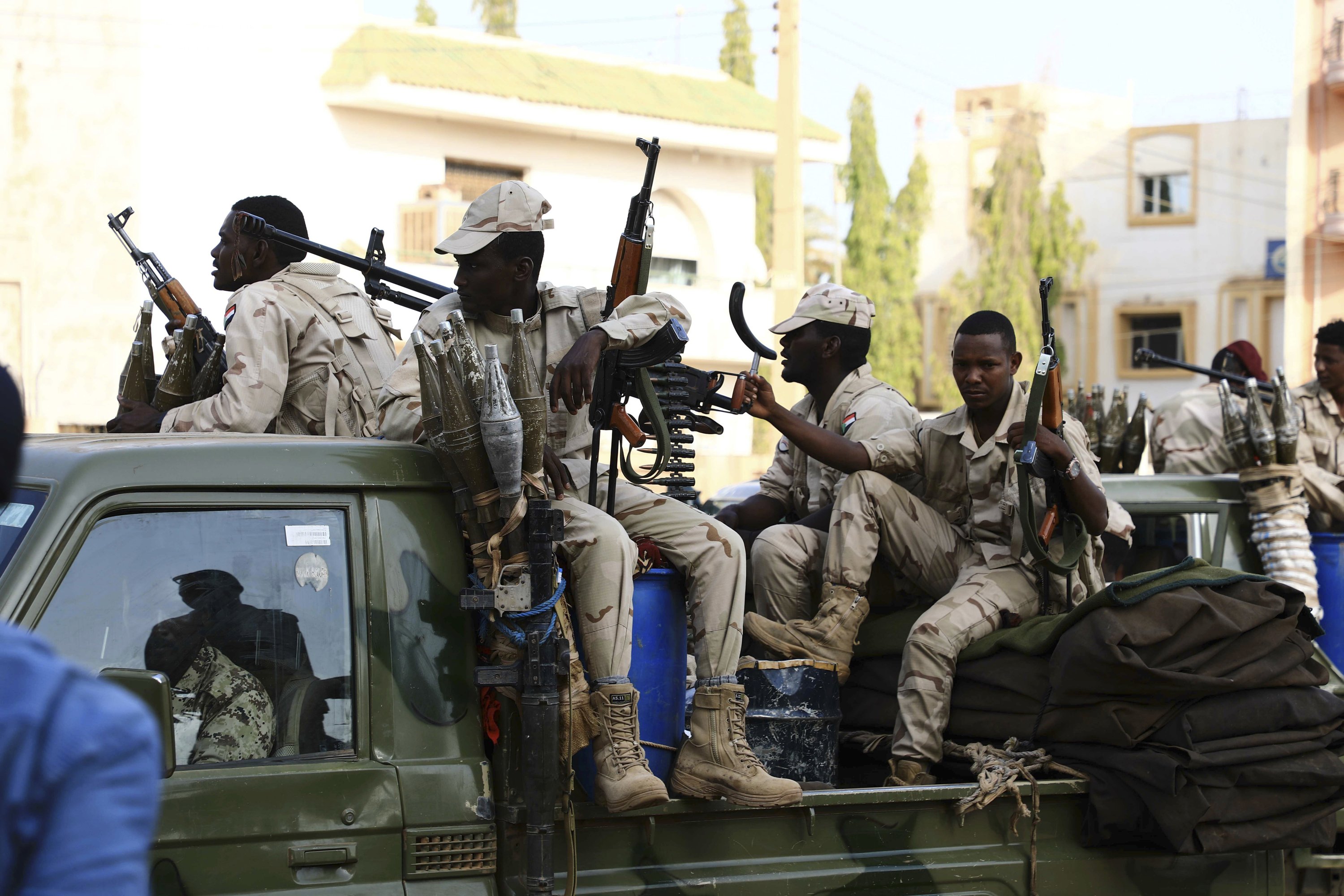 Sudan protesters urge night rallies amid standoff with army | AP News