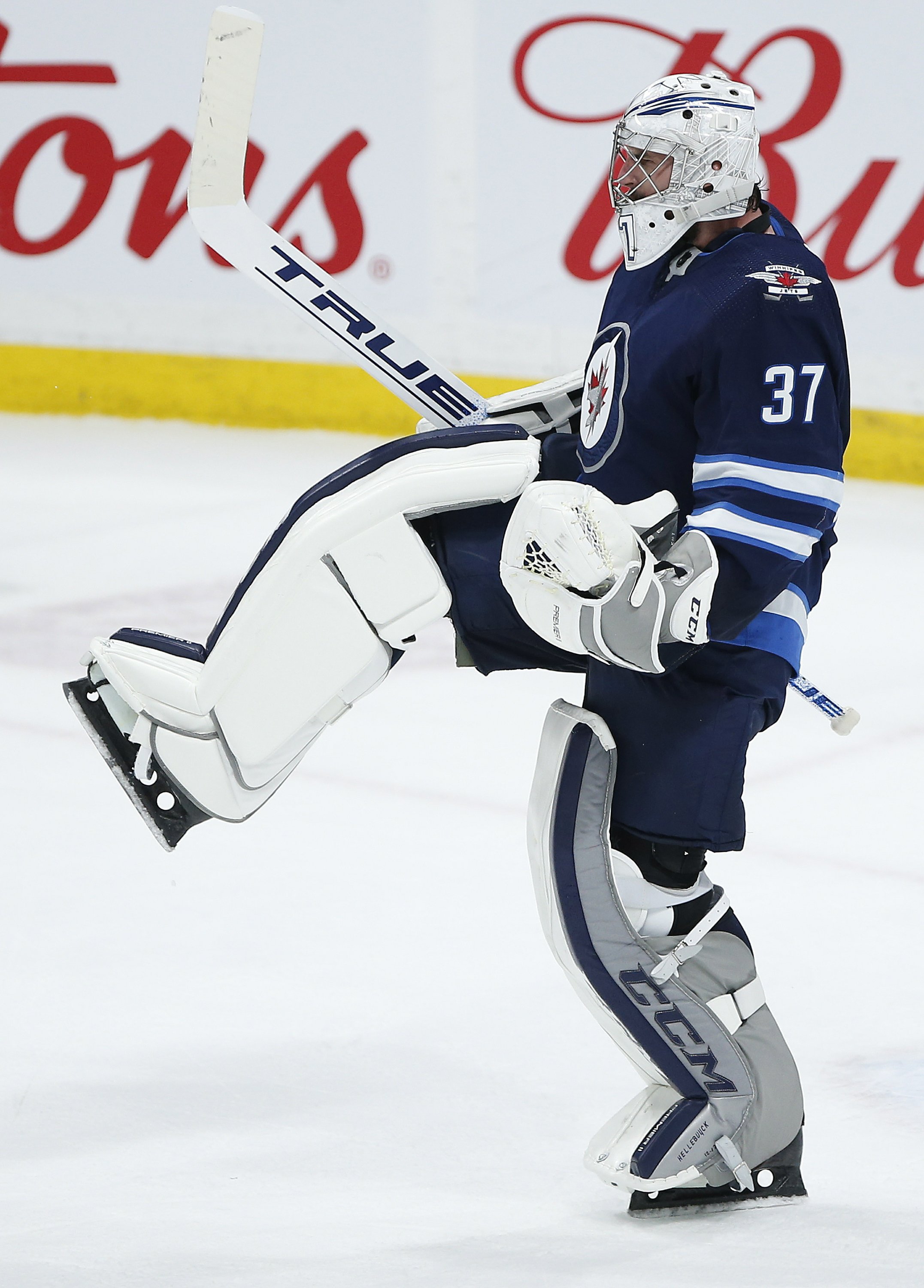 Hellebuyck makes 34 saves to lead Jets past Capitals 3-0 | AP News