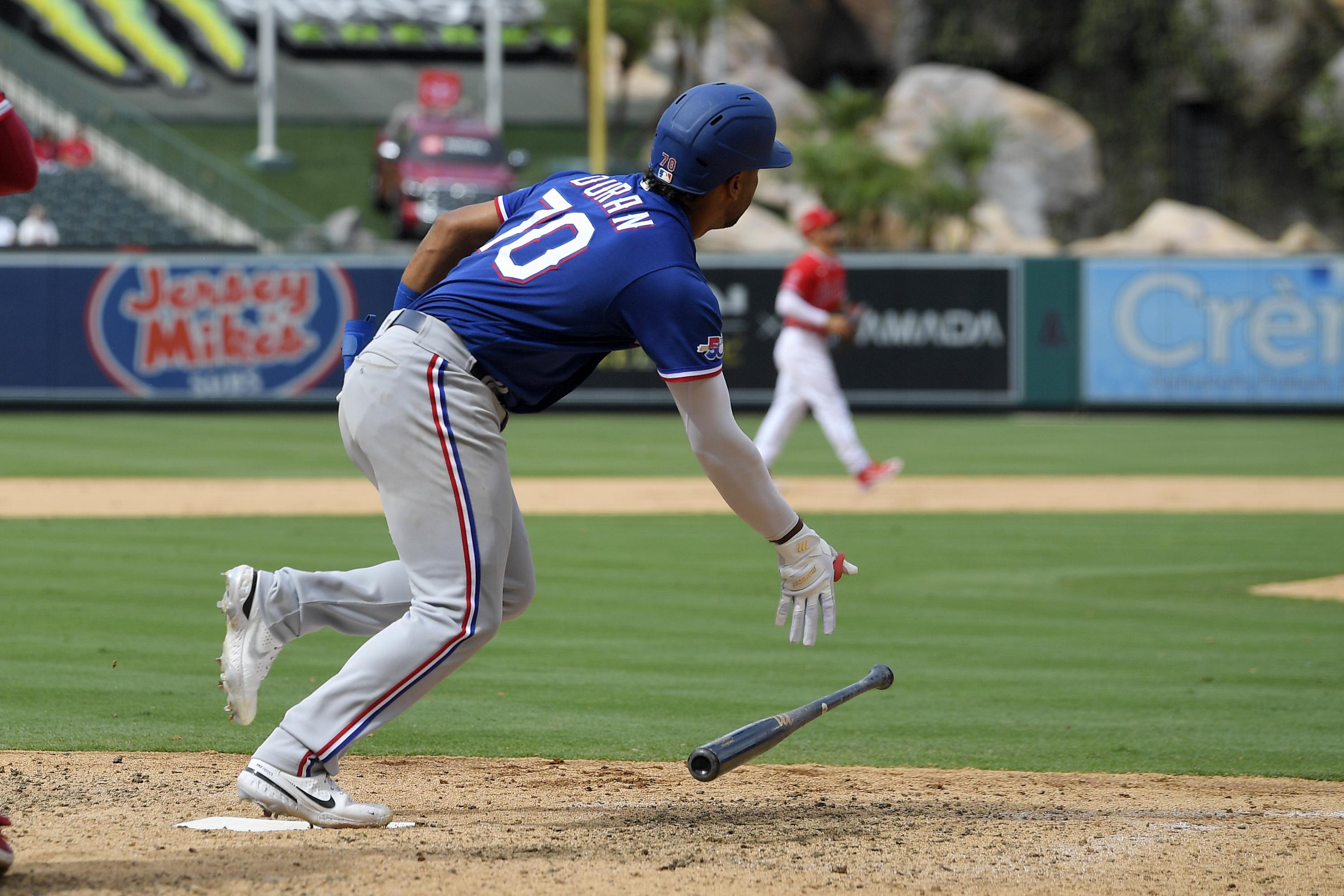Duran rallies Rangers past Angels despite immaculate inning | AP News