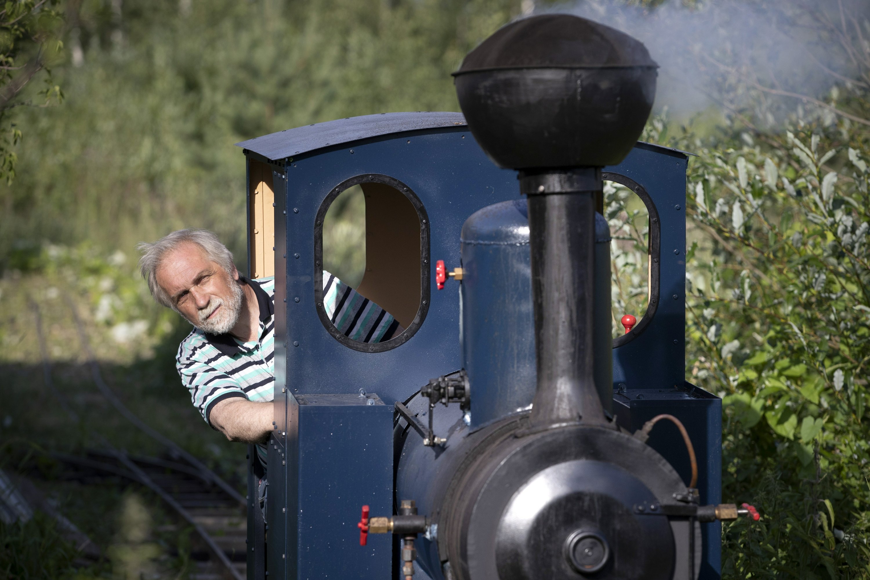 AP Photos: Russian enthusiast builds his own mini-railway | AP News