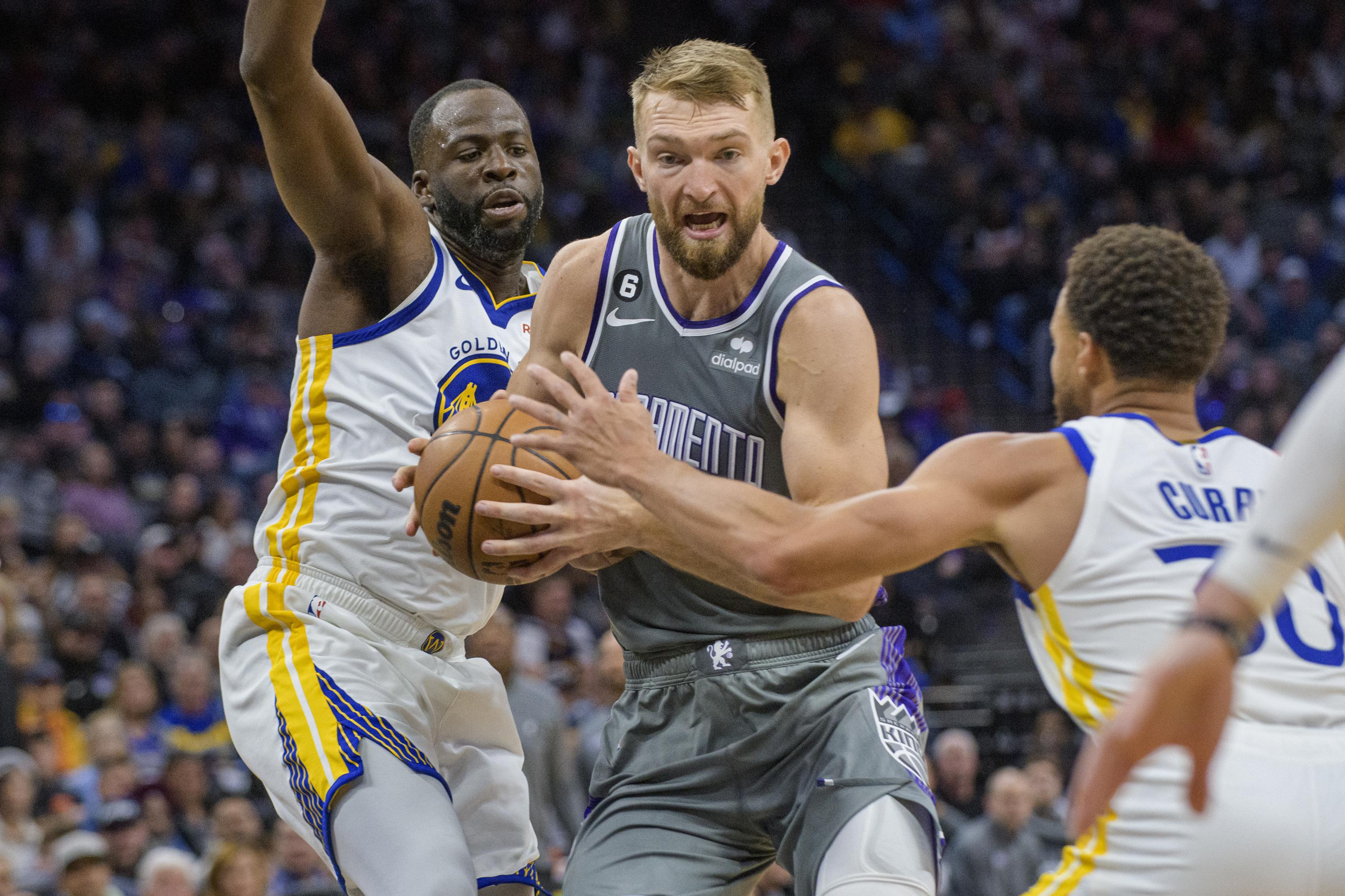 Sabonis' 26 points, 22 rebounds lead Kings over Warriors | AP News
