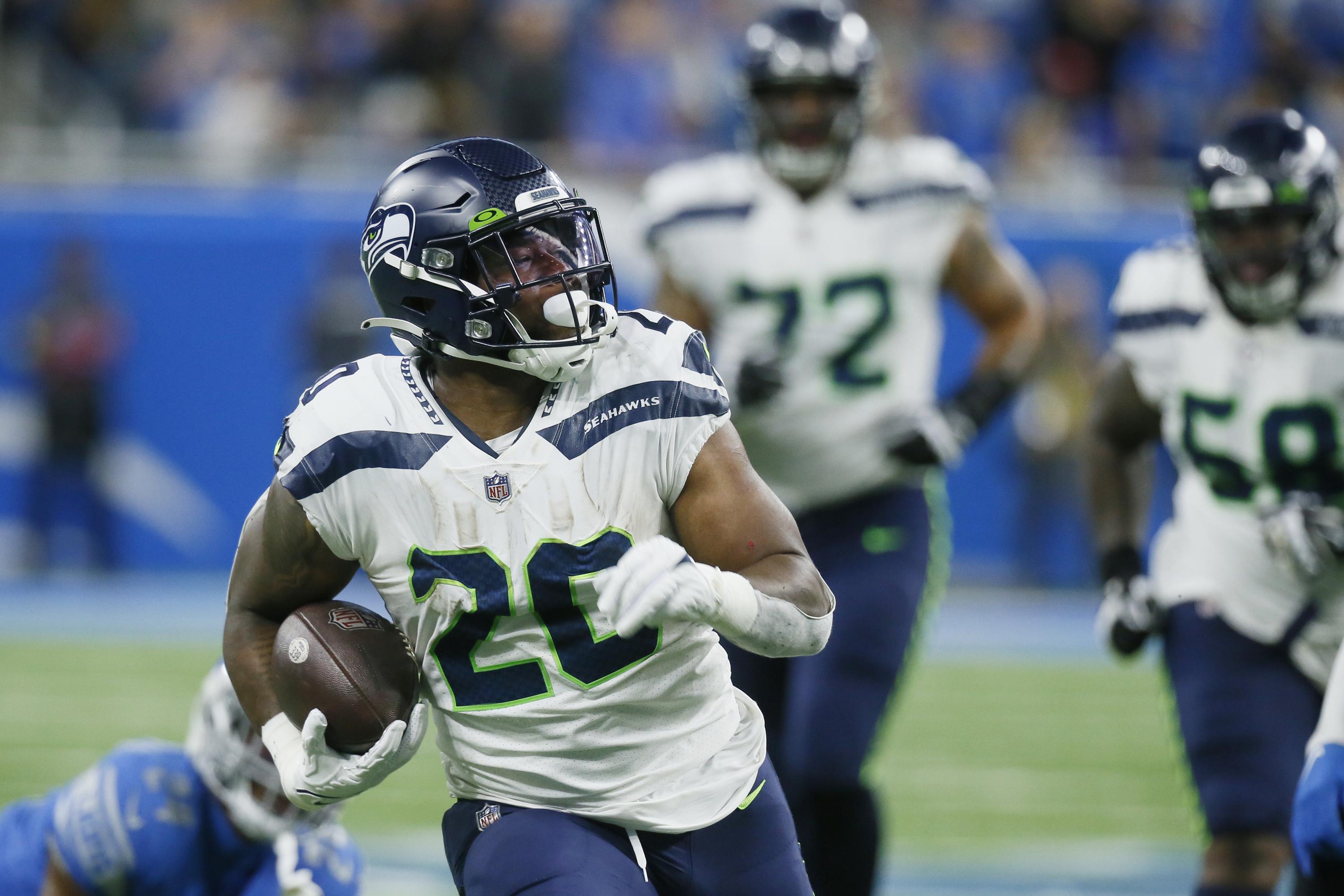 Smith y Penny lideran ataque de Seahawks para vencer a Lions | AP News