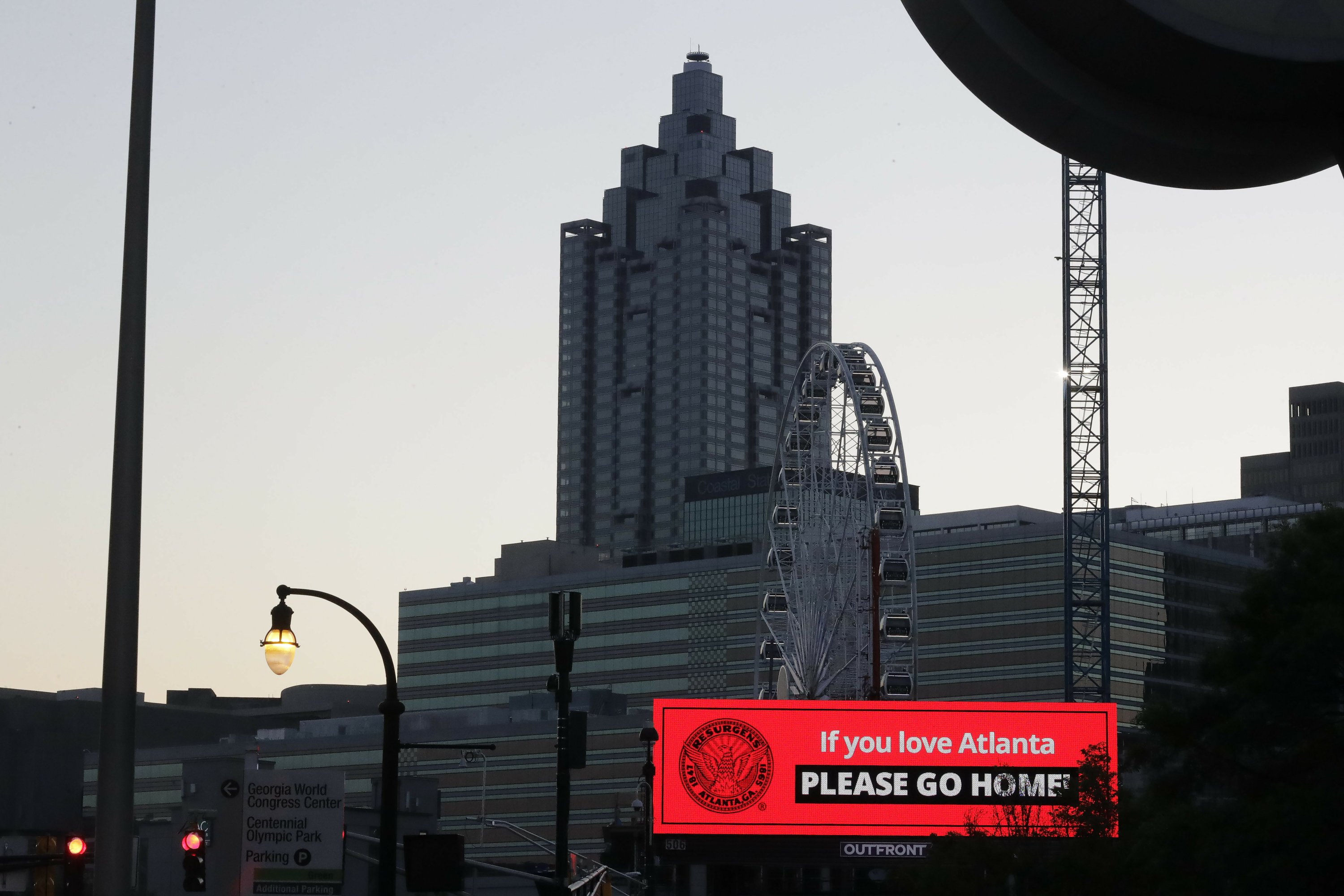 National Guard troops sent to Atlanta; city invokes curfew | AP News