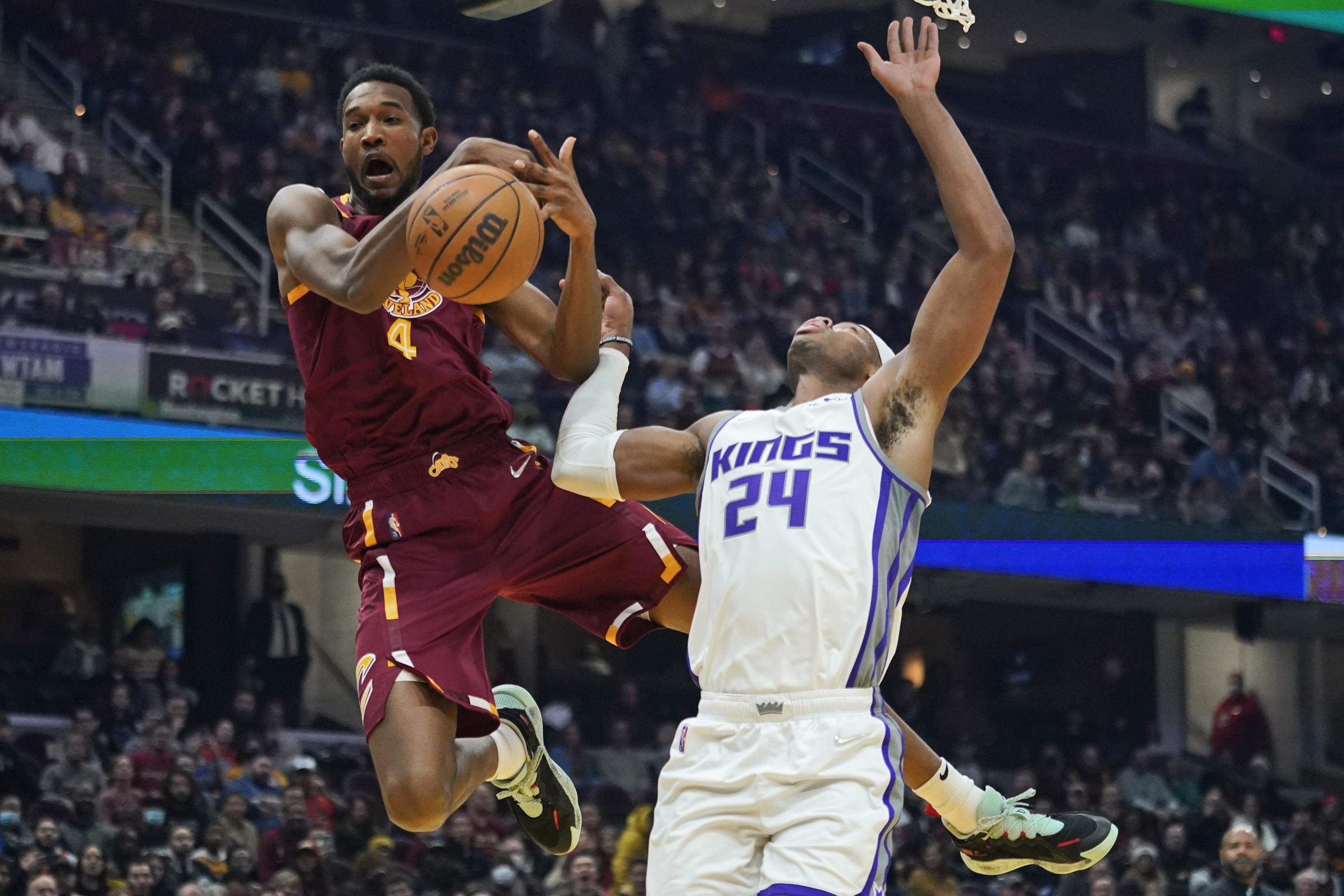 Cavaliers score 81 points in first half, beat Kings 117-103 | AP News