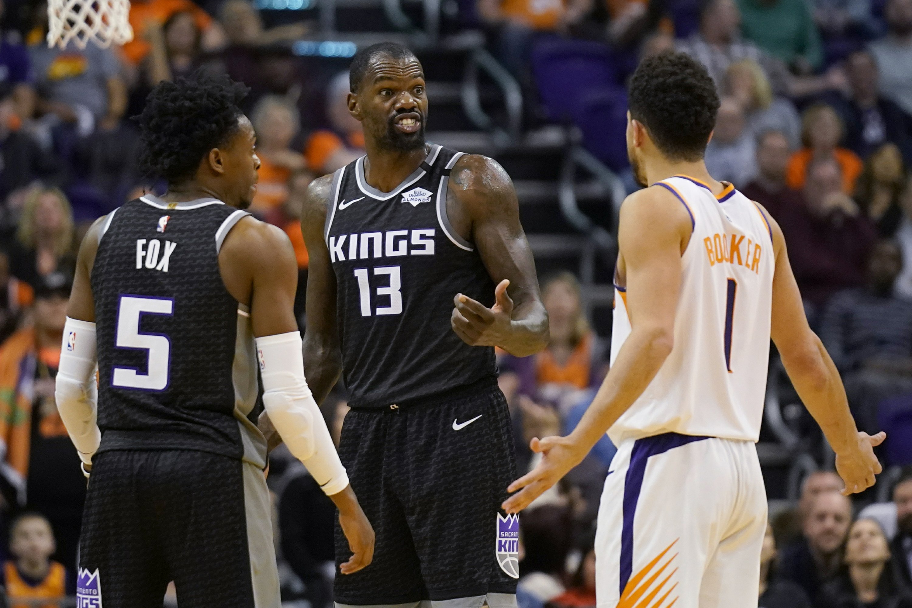 Kings rally from 21 points down, beat Suns 114-103 | AP News