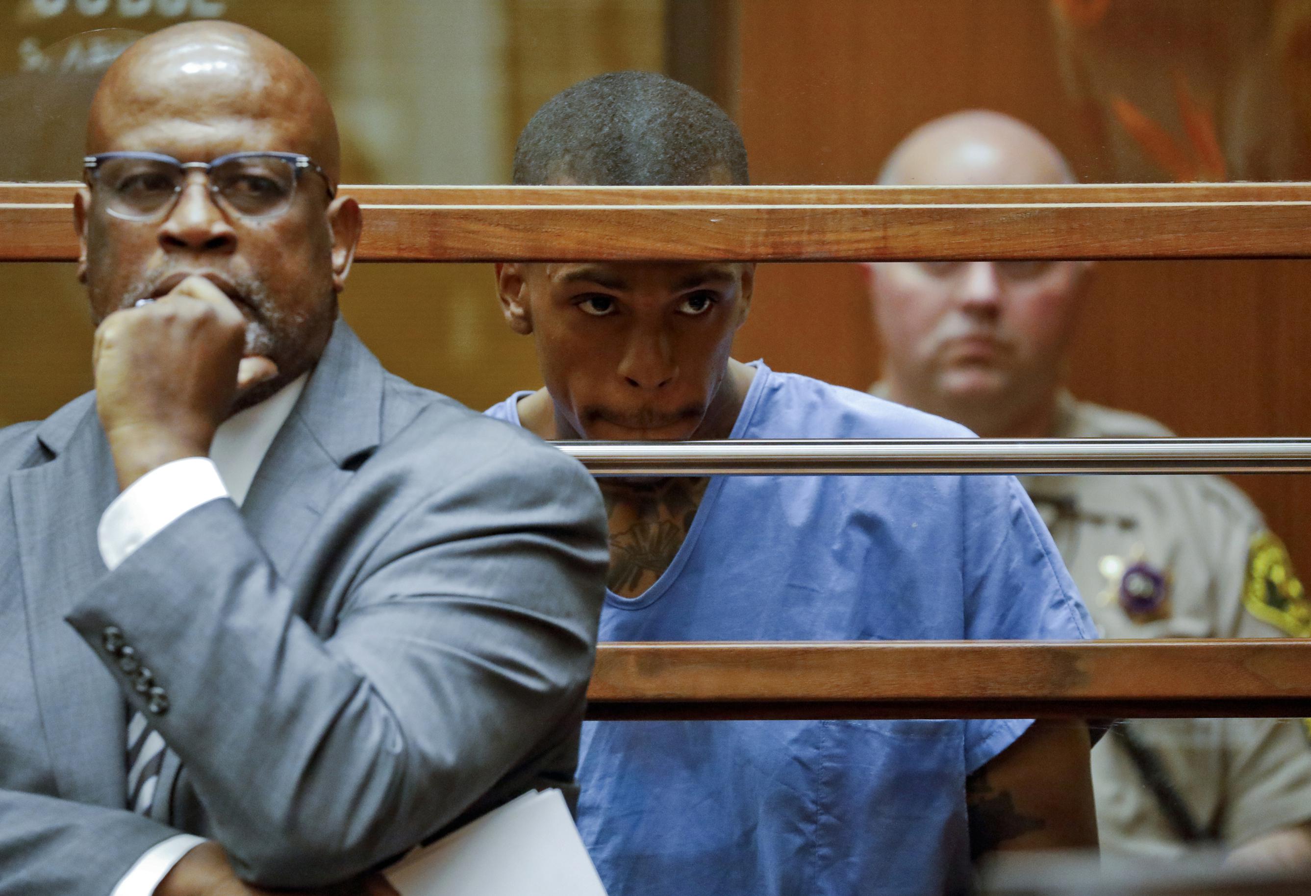 Witness says 'snitching' talk preceded Nipsey Hussle killing | AP News