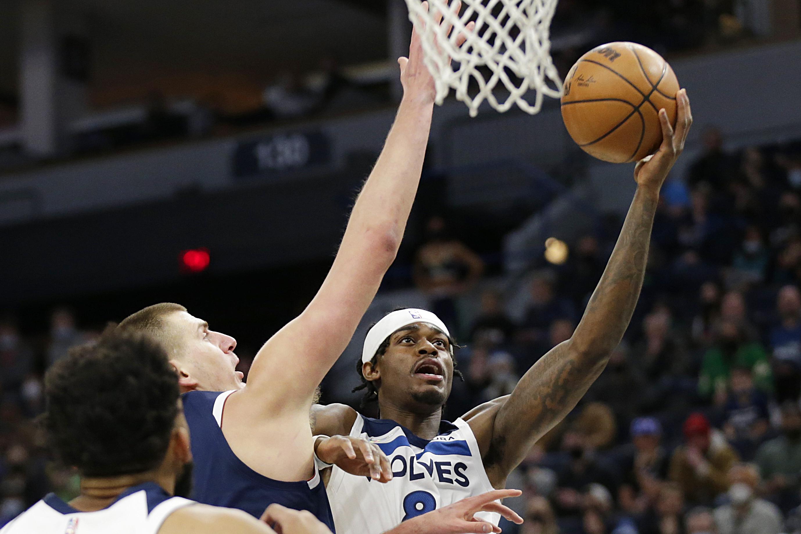 Wolves' bench leads the way in 130-115 win against Nuggets | AP News