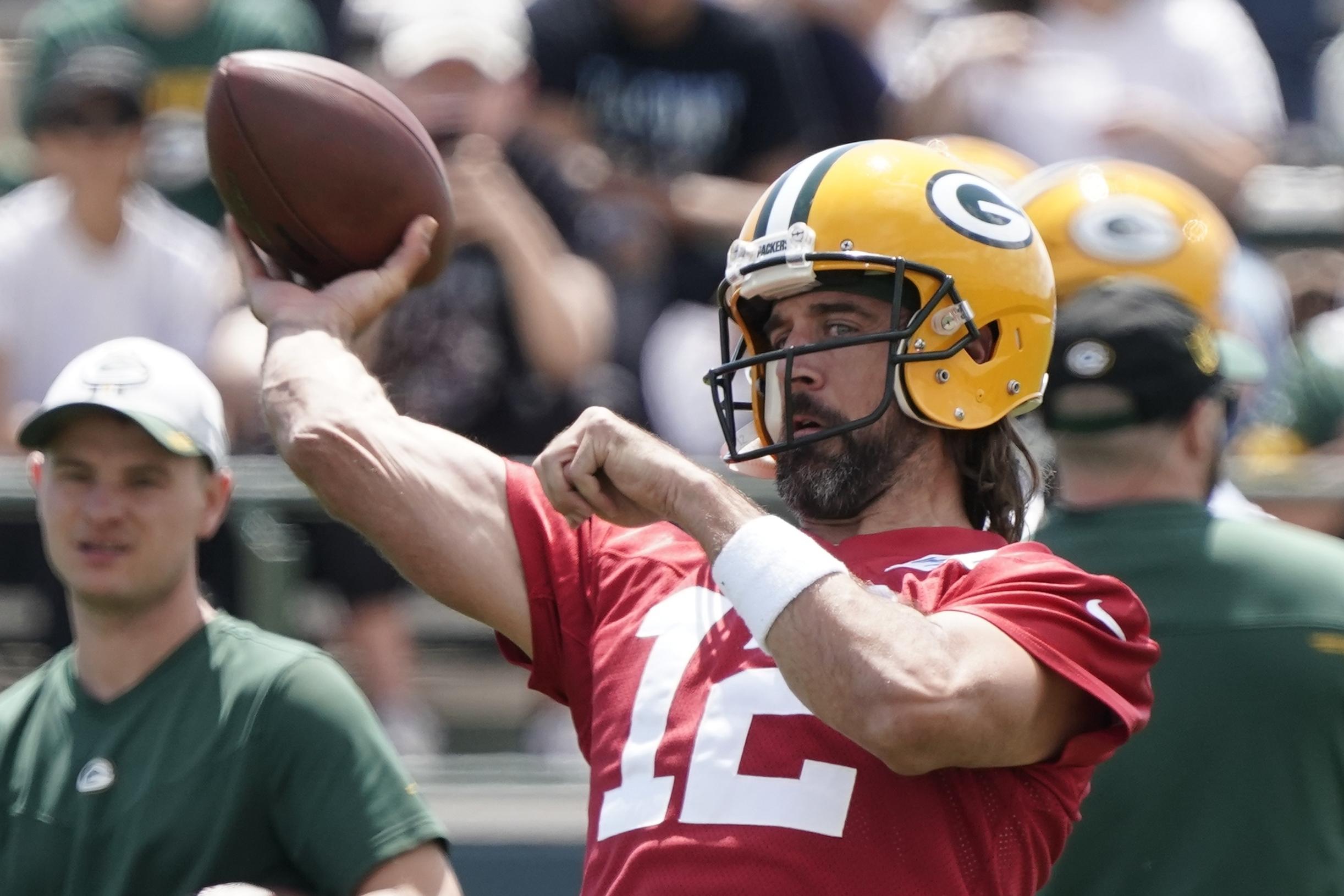 Packers camp gives Rodgers chance to work with his new WRs | AP News