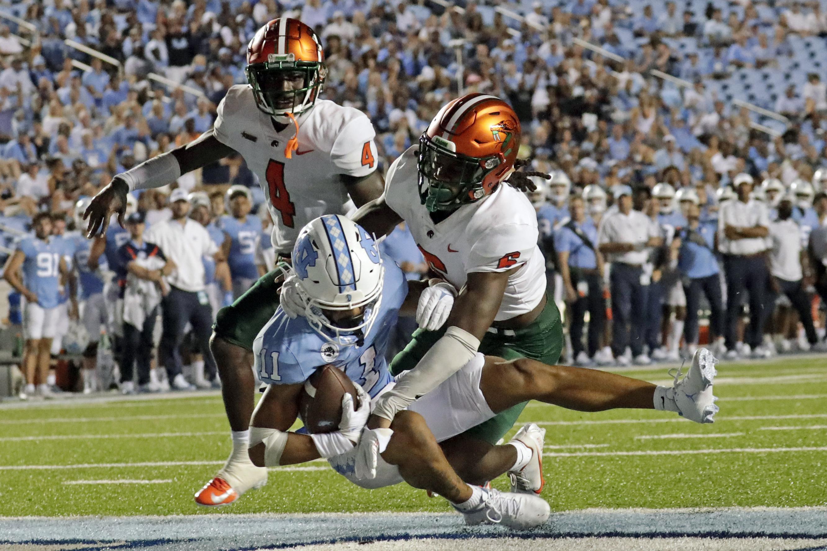 UNC receiver Downs out vs. App State with lower body injury | AP News