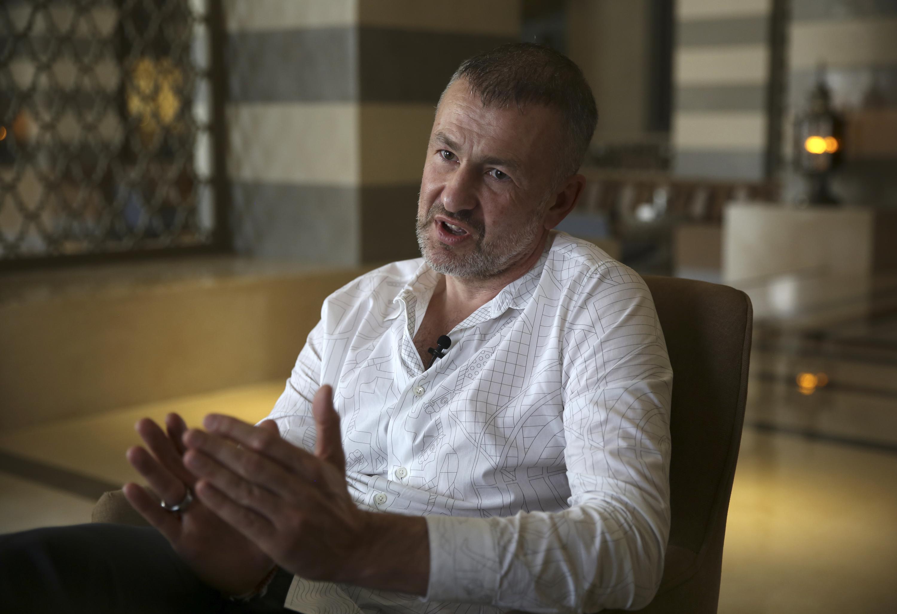 Sanctioned tycoon says Russia wants to engage on climate | AP News