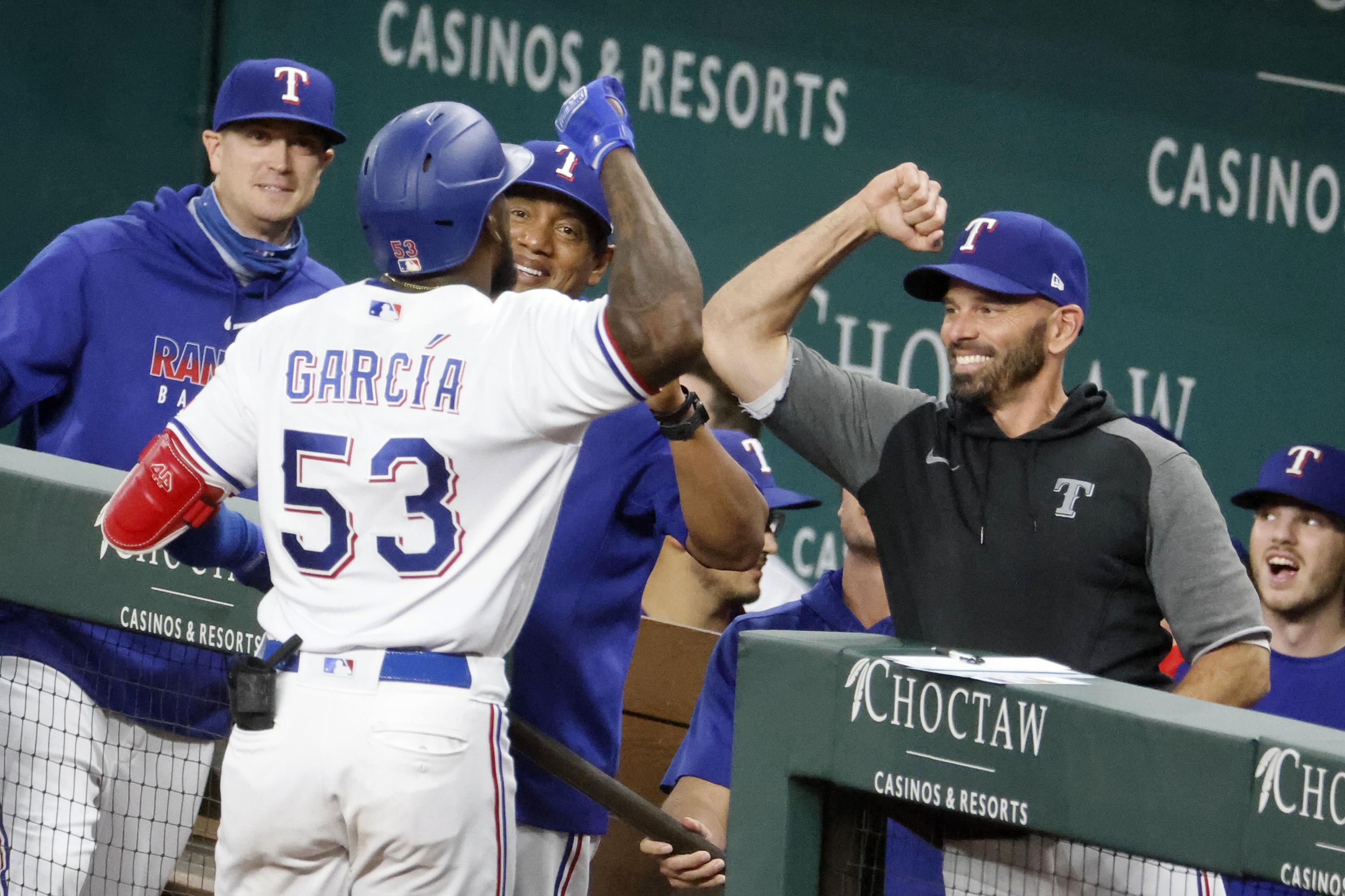 García hits 2 more home runs, powers Rangers past Astros 8-4 | AP News