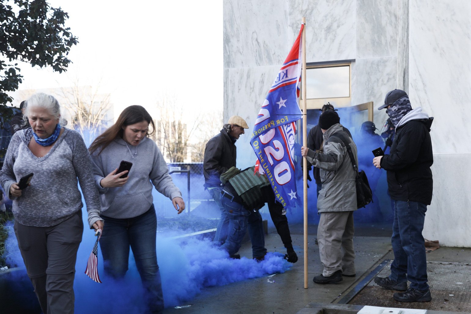 Tensions rise inside and outside of Oregon's Capitol | AP News