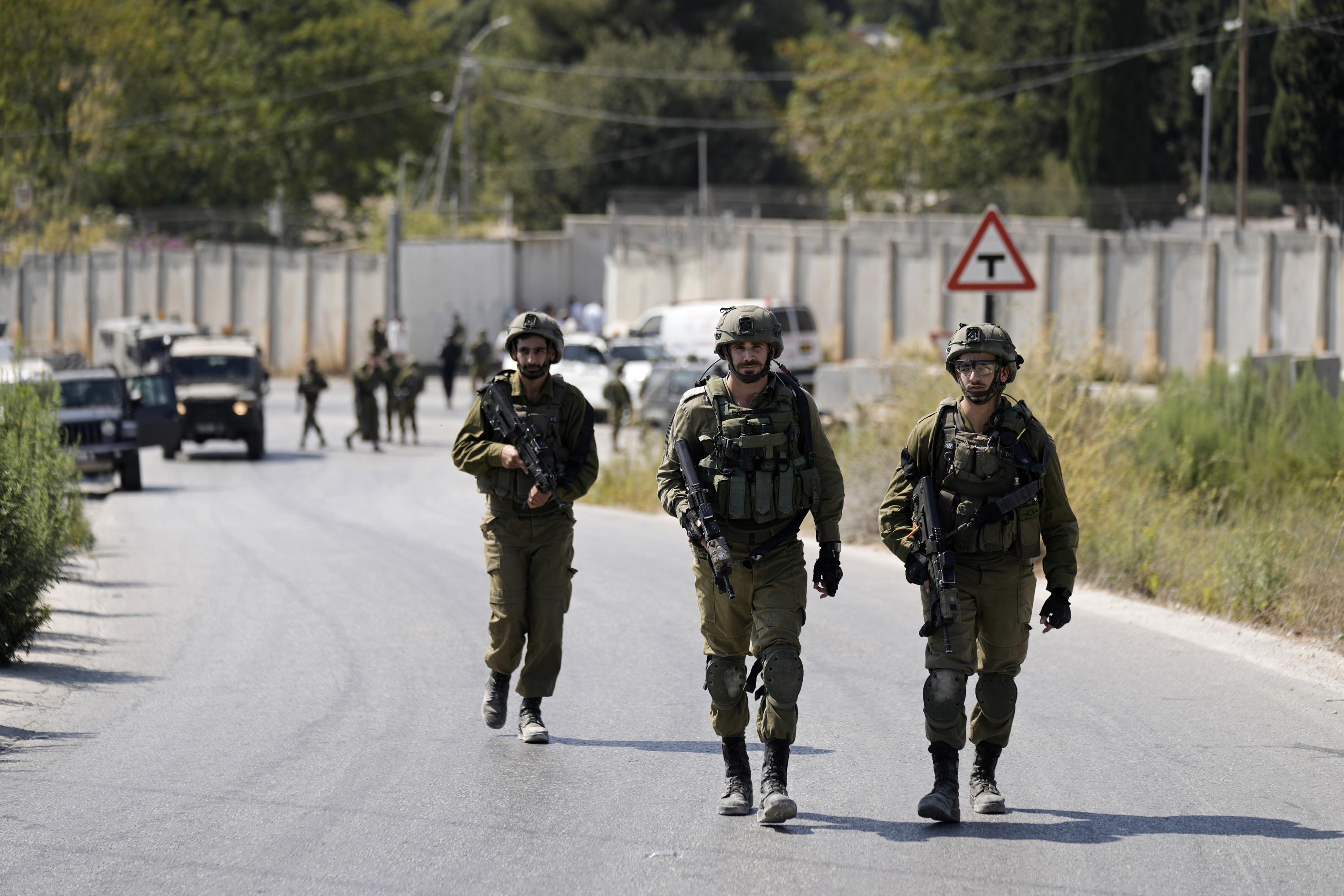Israeli soldier killed by Palestinian militant in West Bank | AP News