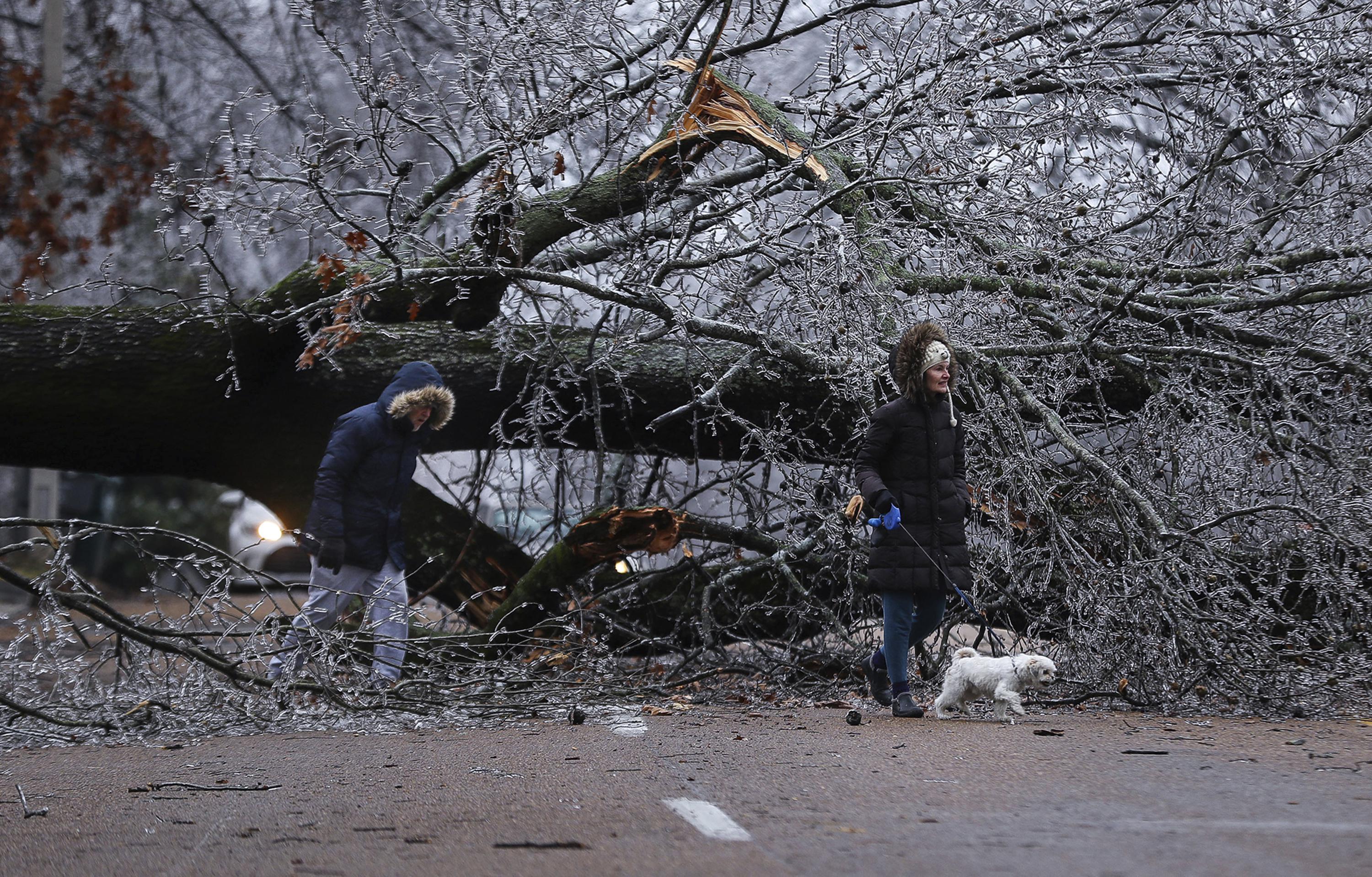 Winter storm live updates: What to know as storm moves East | AP News