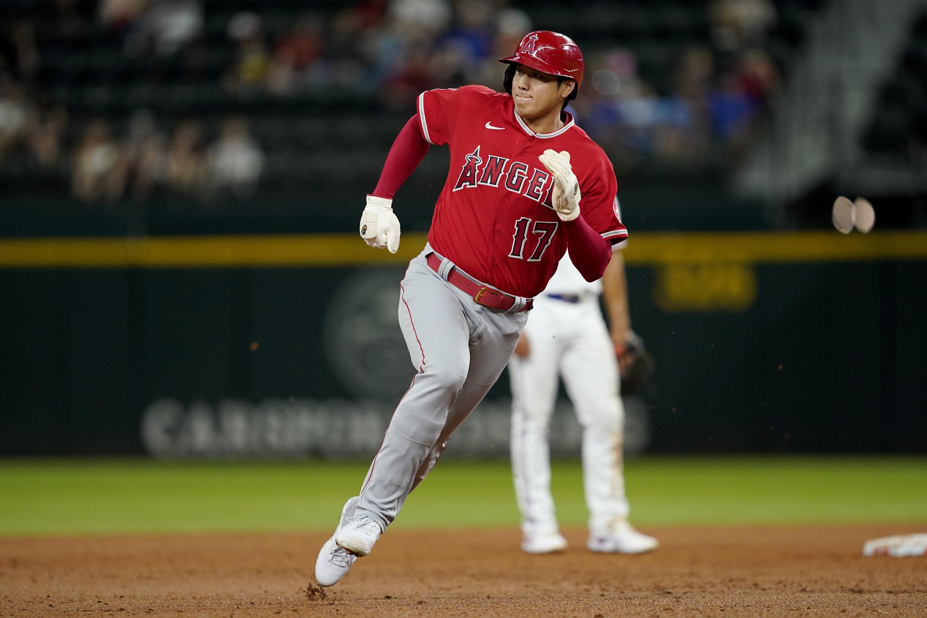 Angelinos derrotan a Rangers a pesar de triple play | AP News Angelinos derrotan a Rangers a pesar de triple play | AP News