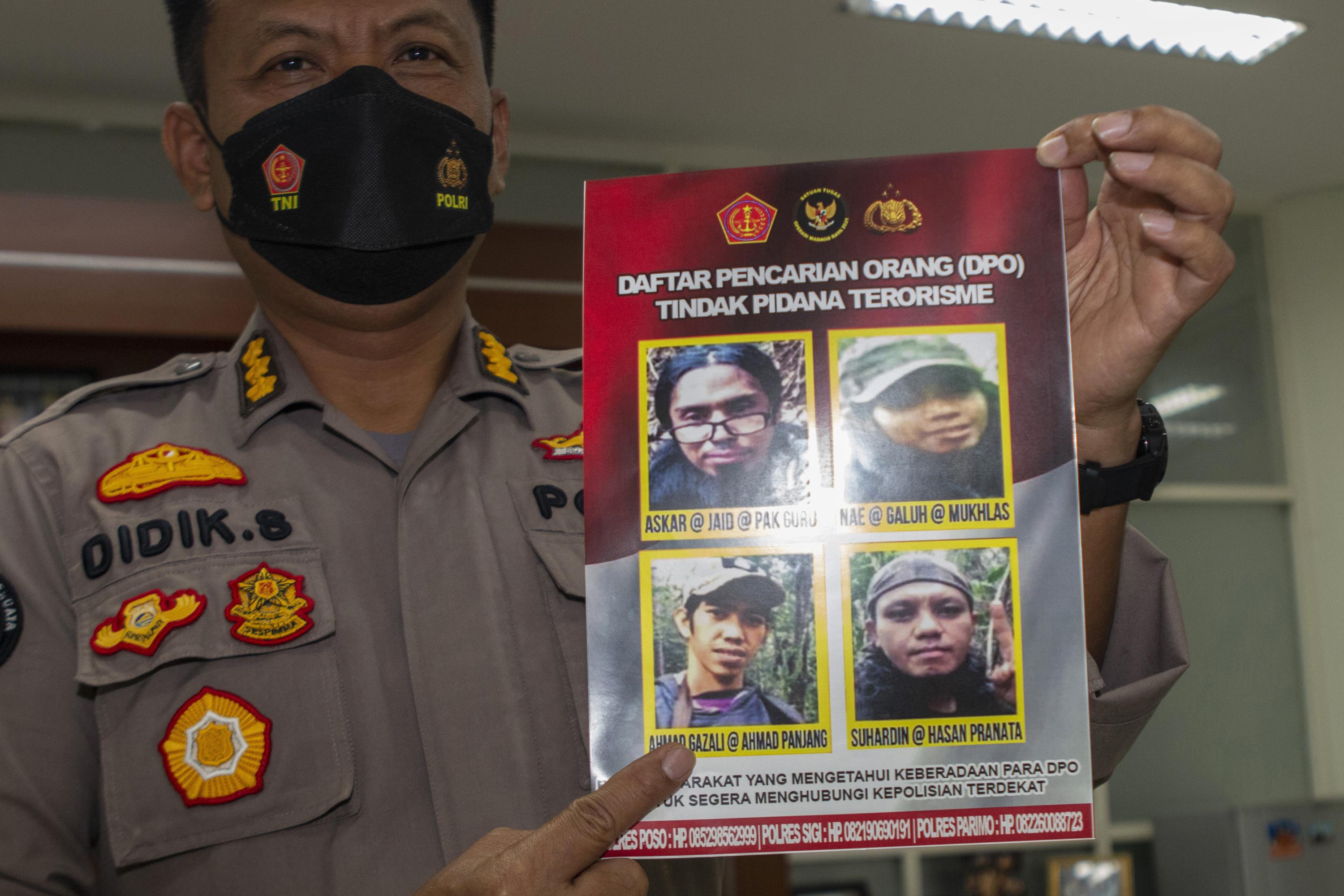 Indonesian police kill militant suspected in farmers' deaths | AP News