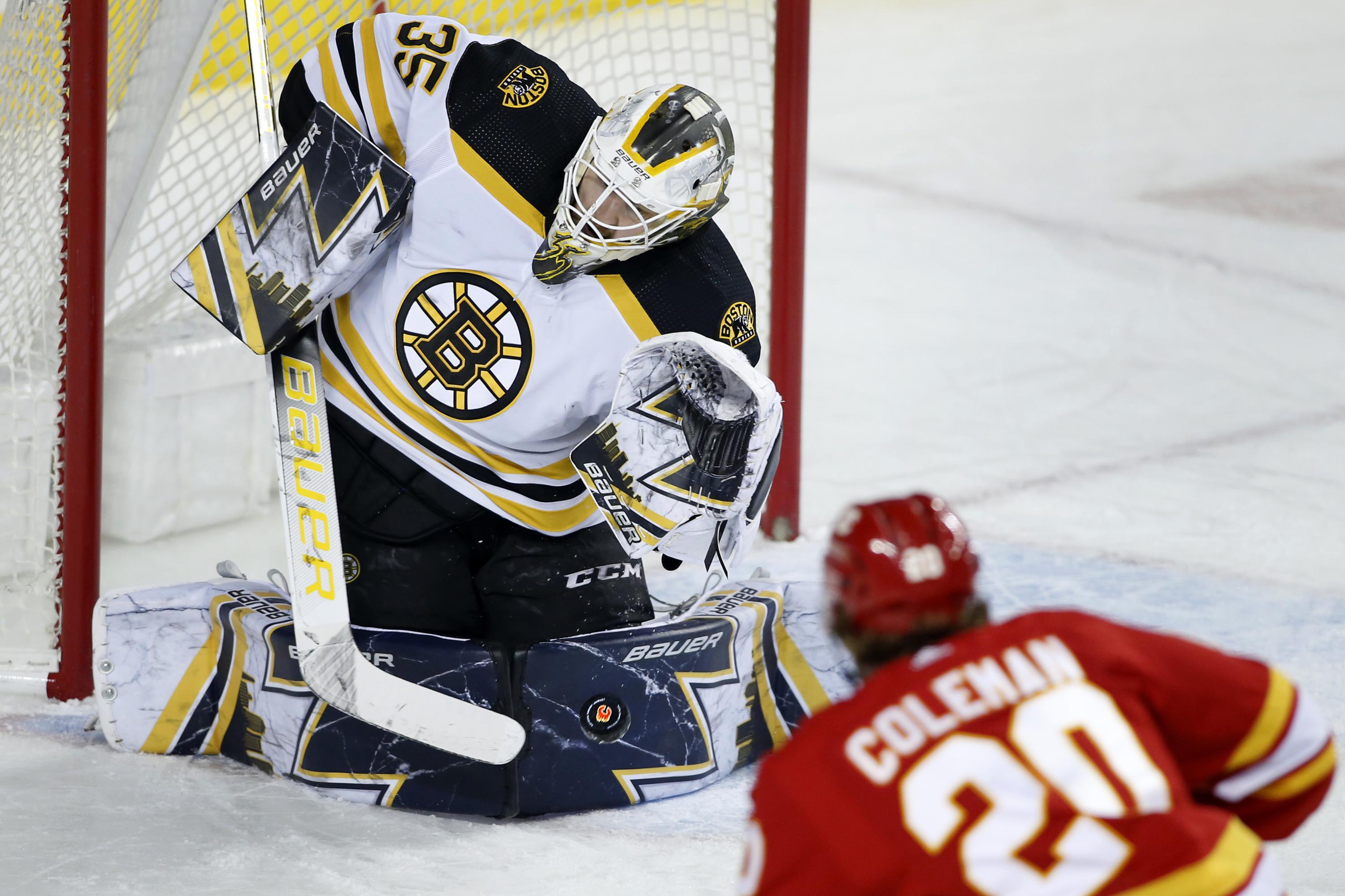 Ullmark makes 40 saves, leads Bruins past Flames 4-2 | AP News