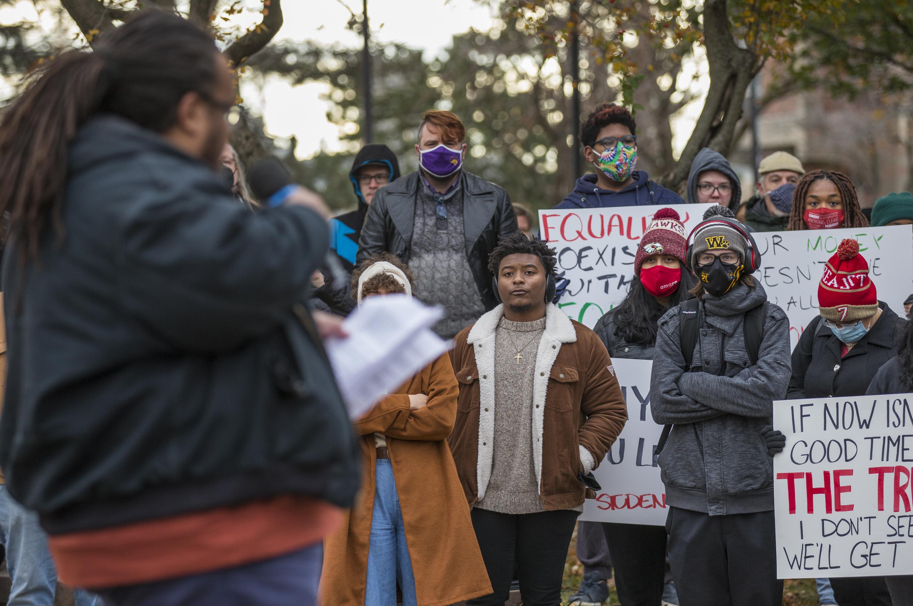 Students protest at Coe College after Black trustee resigns | AP News