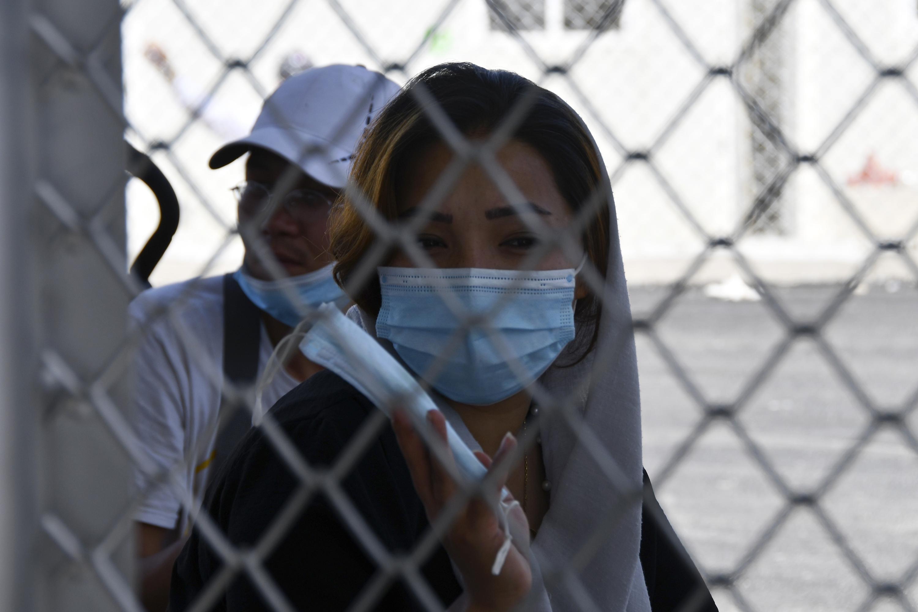 Greek authorities begin moving migrants into new camp | AP News