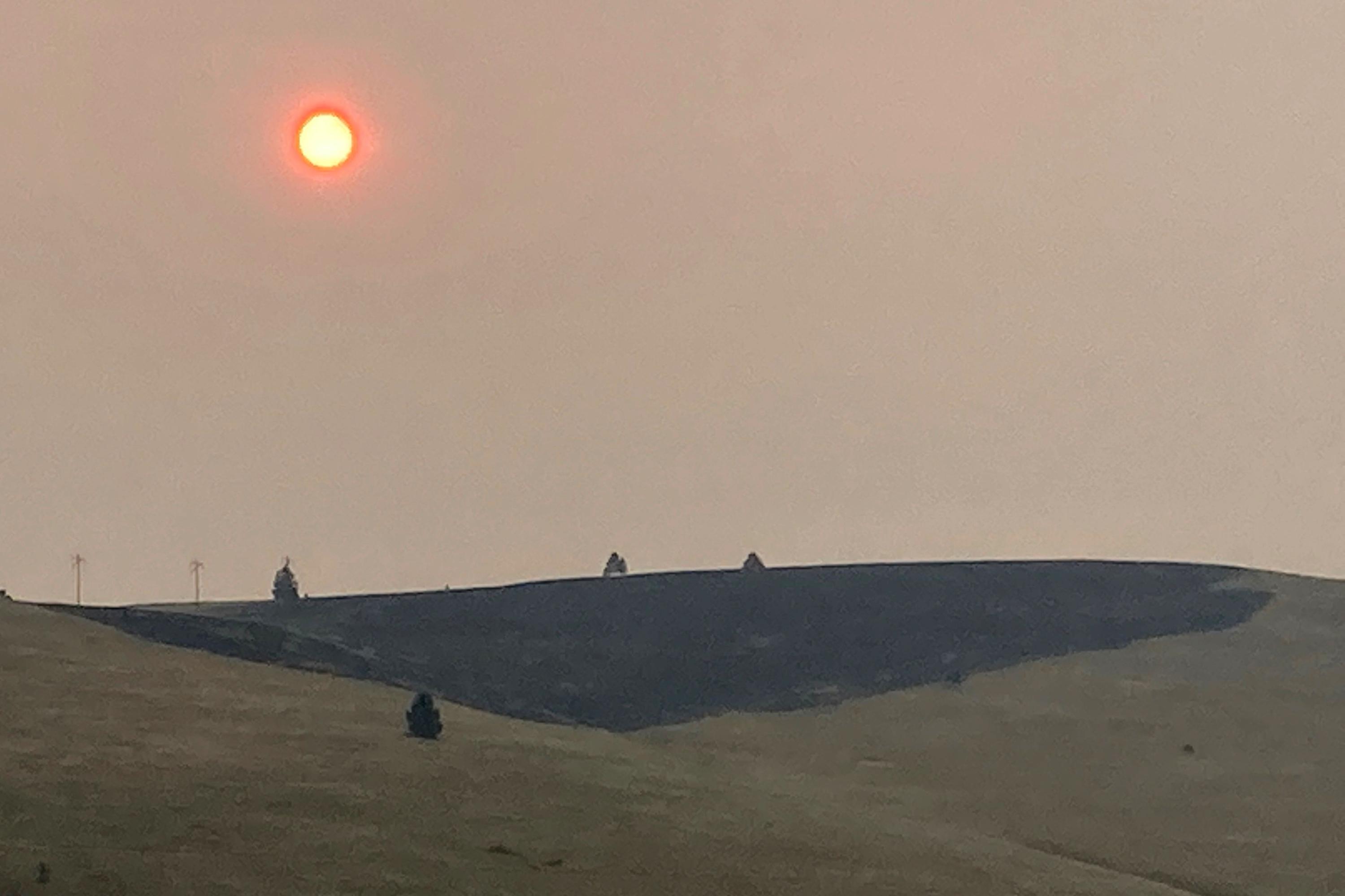 Heat and smoke choke northern Rockies as fire danger spikes | AP News