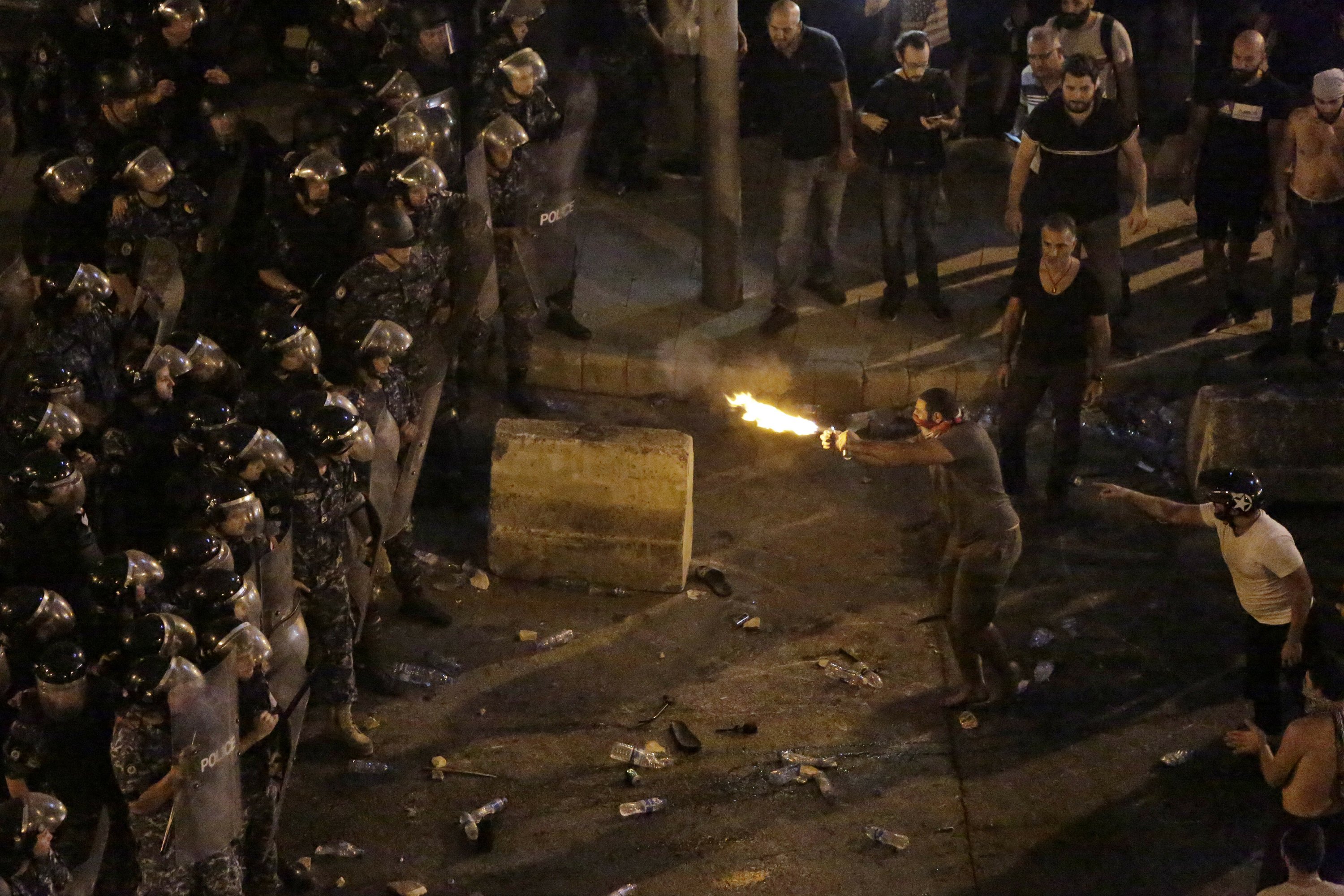 Faced with protests, Lebanon PM blames own gov't for crisis | AP News