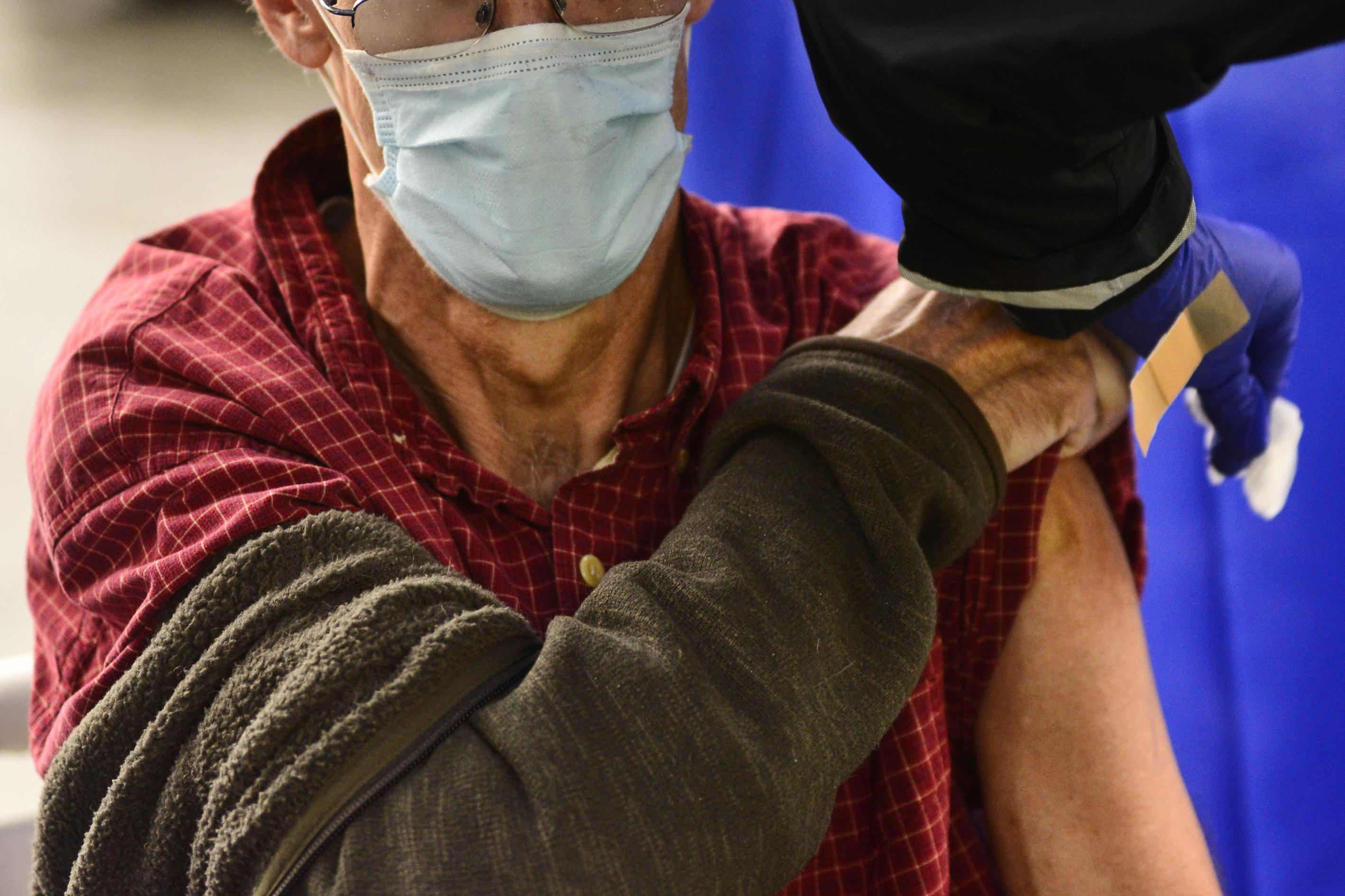 A mild US flu season is waning, but is it really over? | AP News