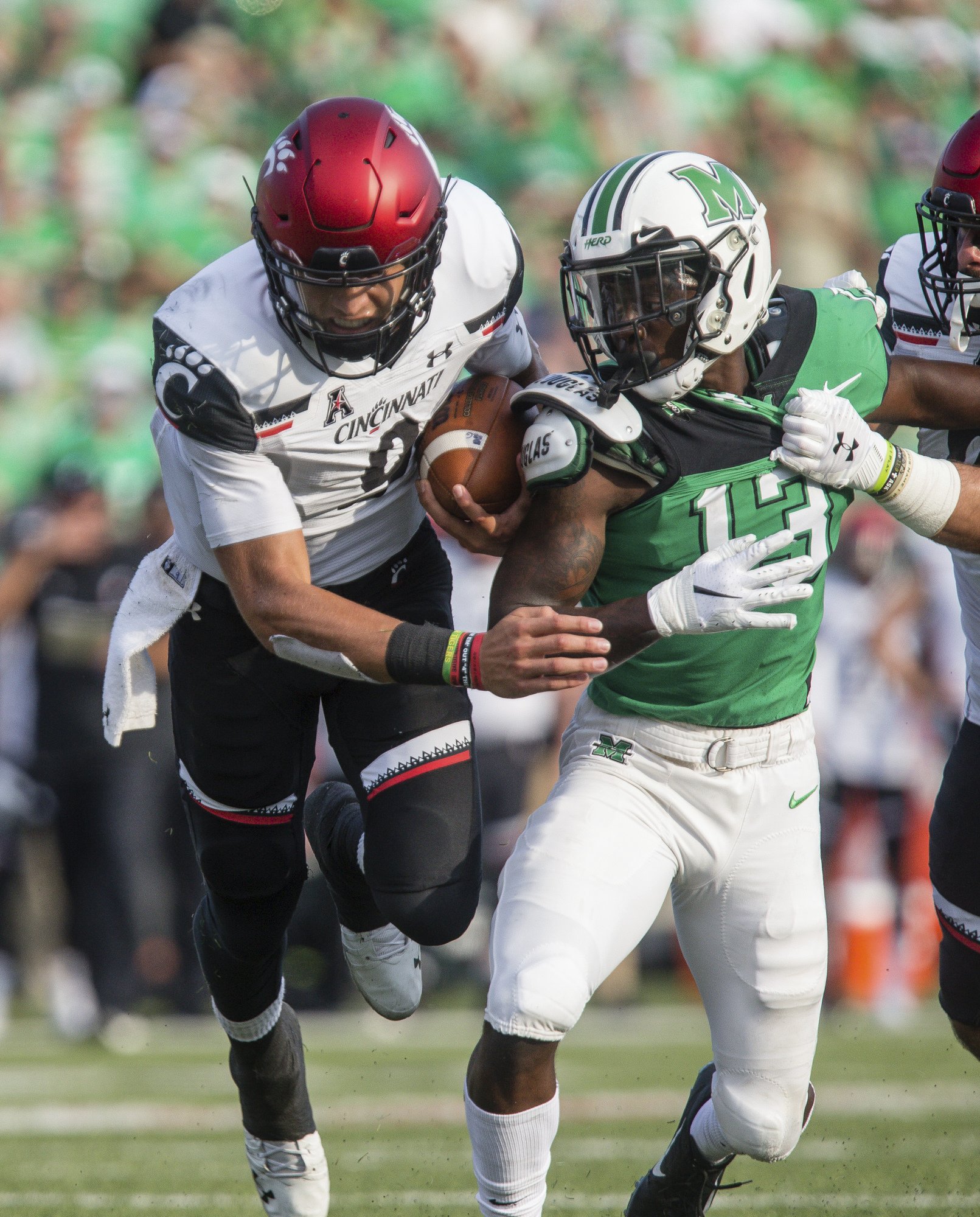 No. 18 UCF tries for 20th straight AAC win at Cincinnati | AP News