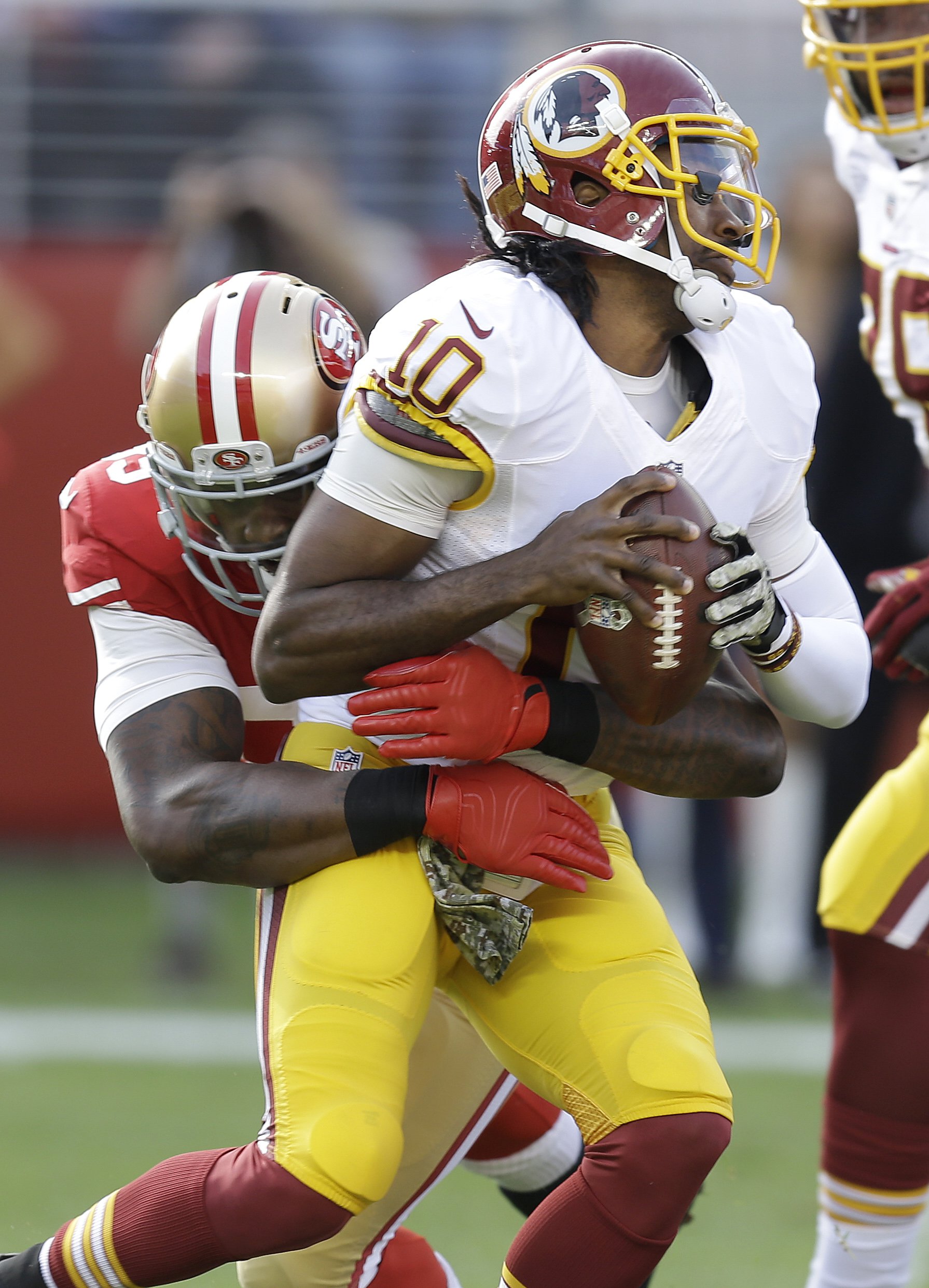 Aldon Smith helps lead in 49ers' 3rd straight win | AP News