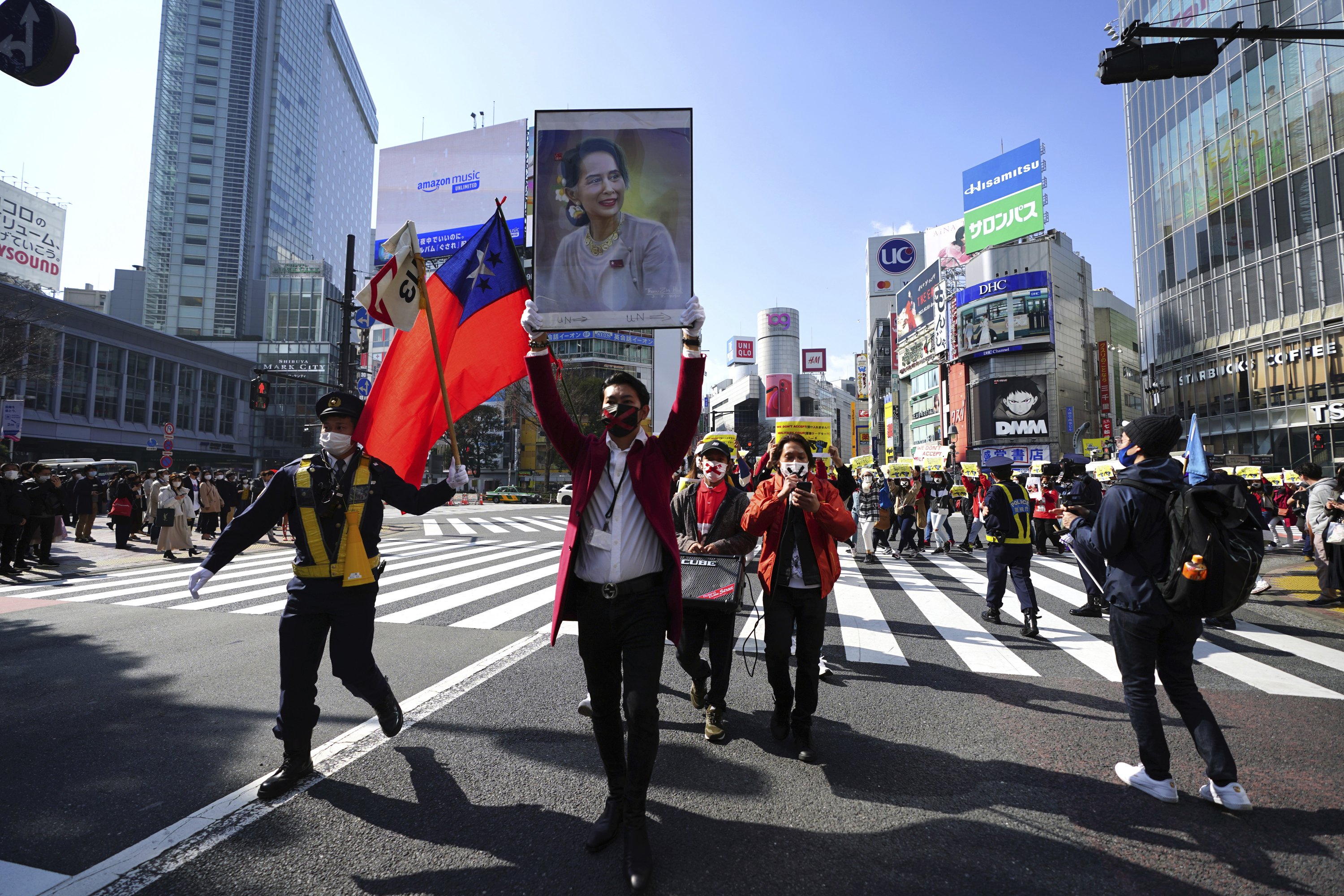 Burmese in Japan march in protest of military coup | AP News