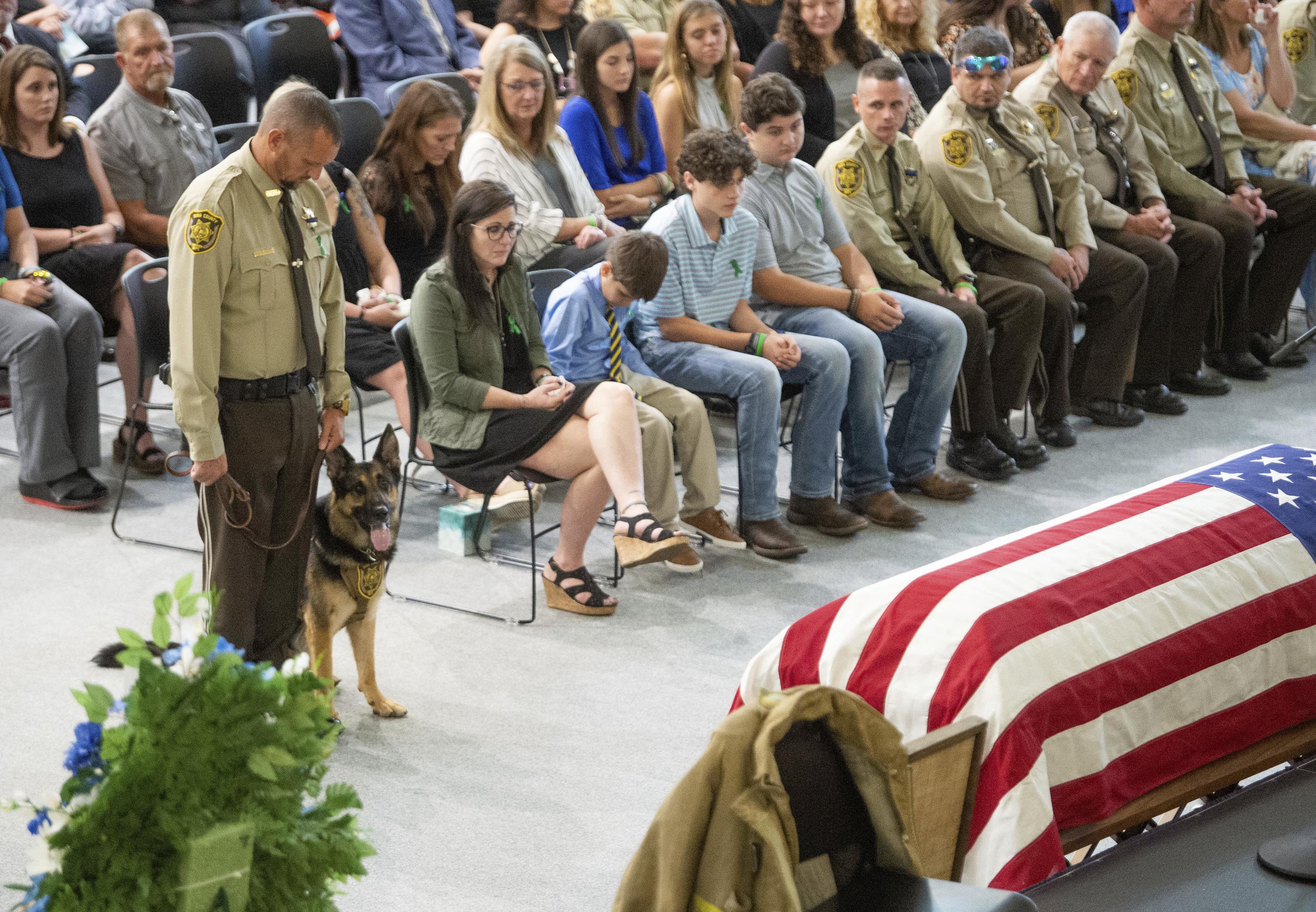 Mourners at funeral remember slain Alabama deputy as a hero | AP News
