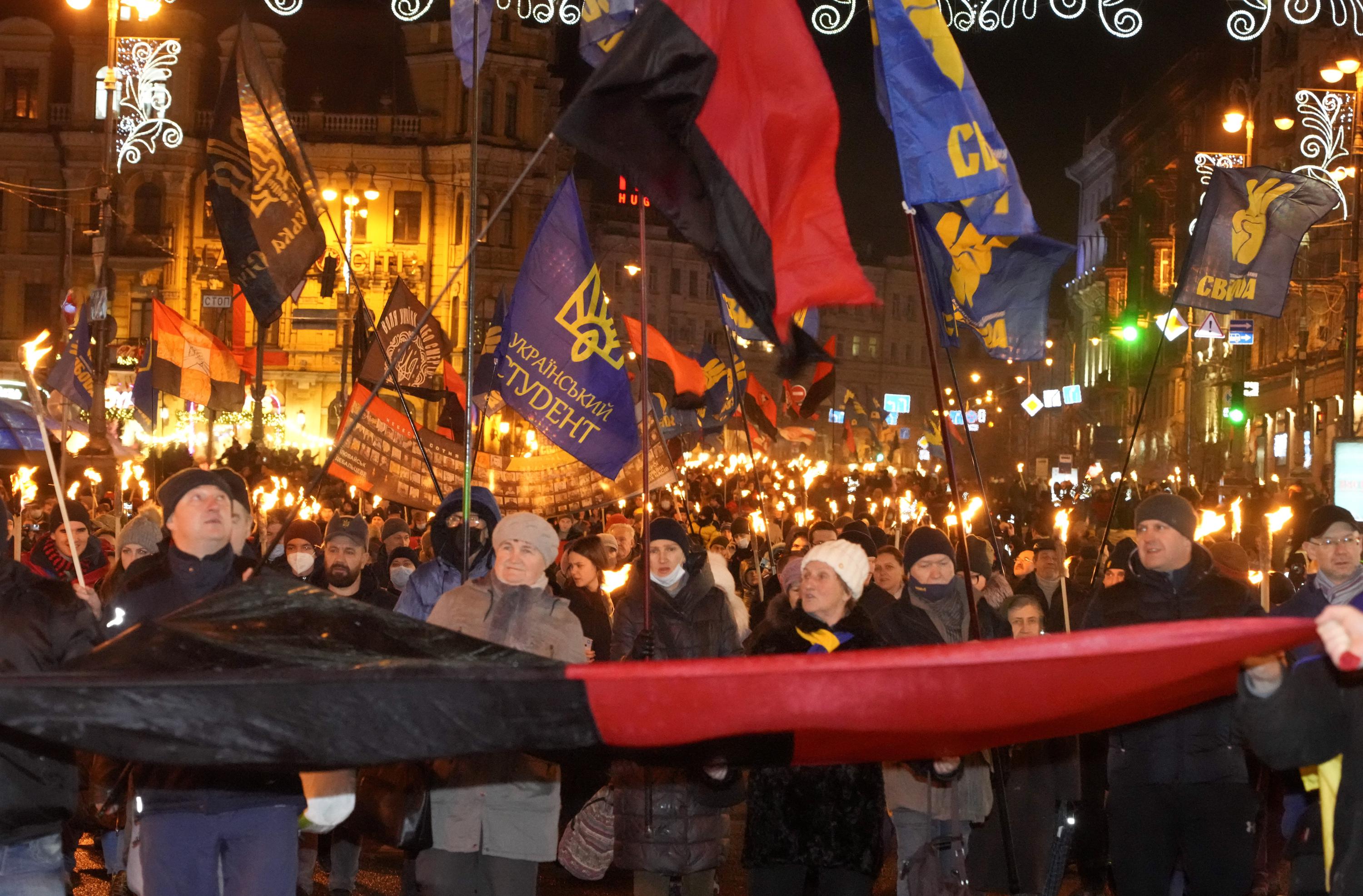 Ukraine nationalists march to honor wartime partisan leader | AP News