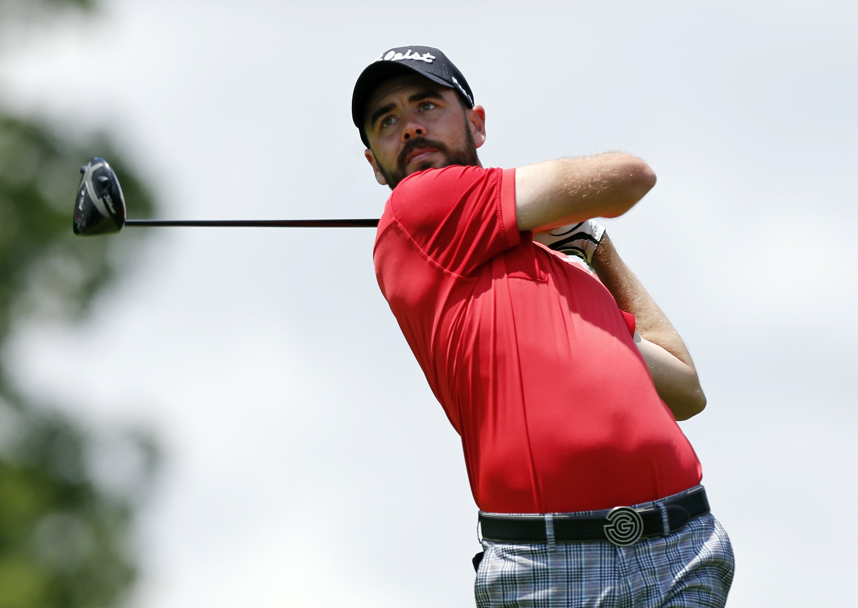 Merritt takes early lead by 2 shots at Memorial | AP News