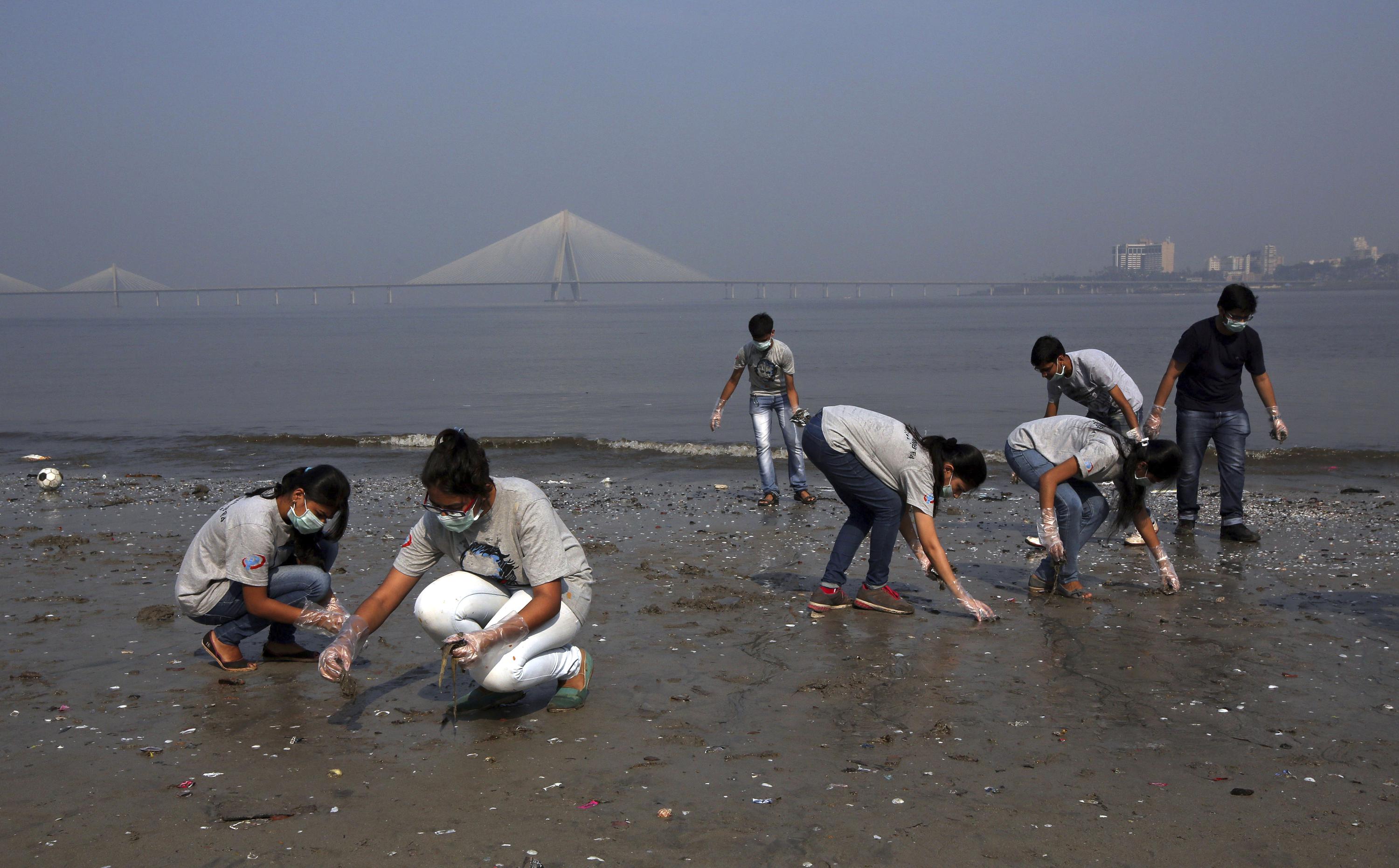 Millions across India join cleanliness campaign | AP News