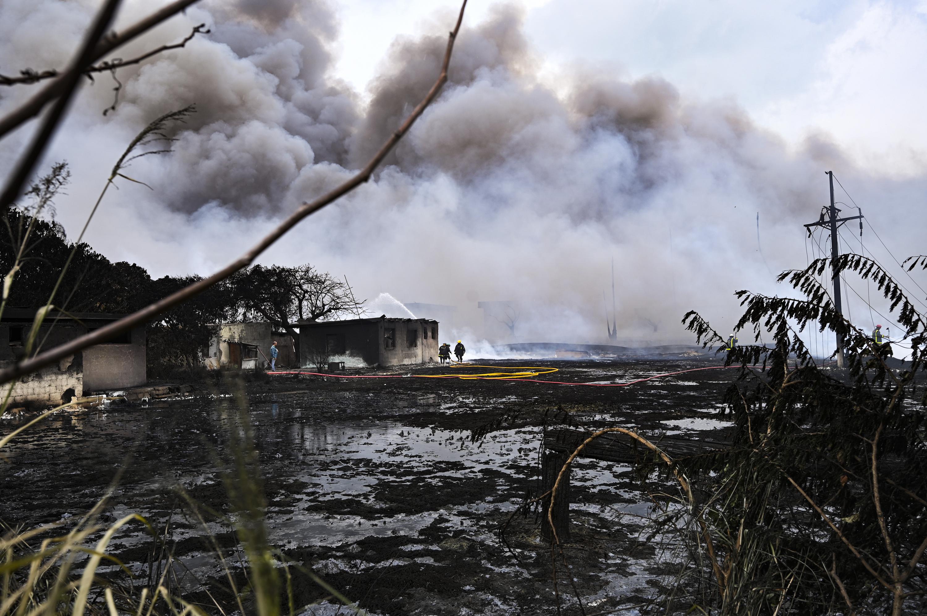 Raging fire consumes 4th tank at Cuba oil storage facility | AP News
