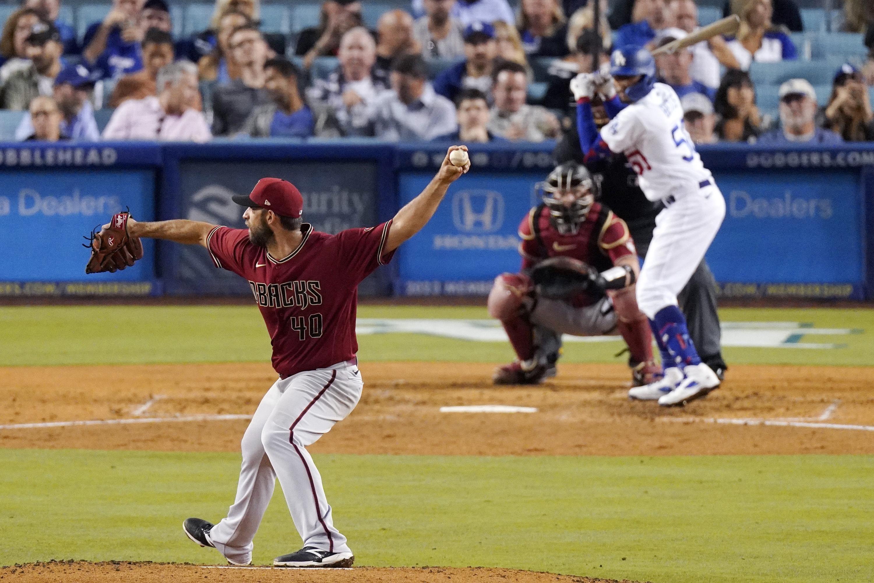 Bumgarner gets 1st win since July, D-backs beat Dodgers 6-1 | AP News